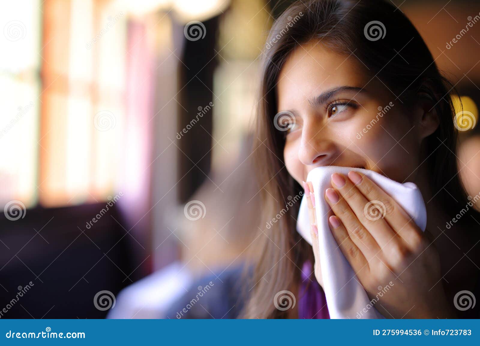 Happy Woman Using Napkin in a Restaurant Stock Photo - Image of ...