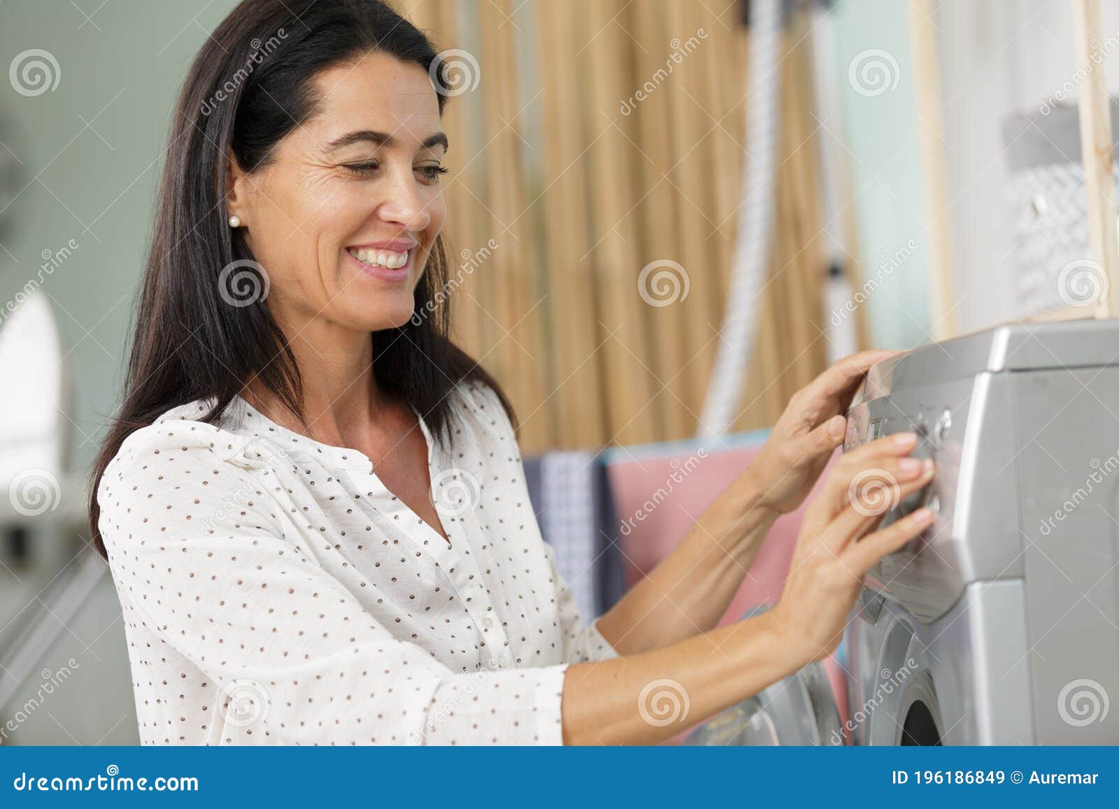 Happy Woman Using Washing Machine Stock Image - Image of smell, laundry ...