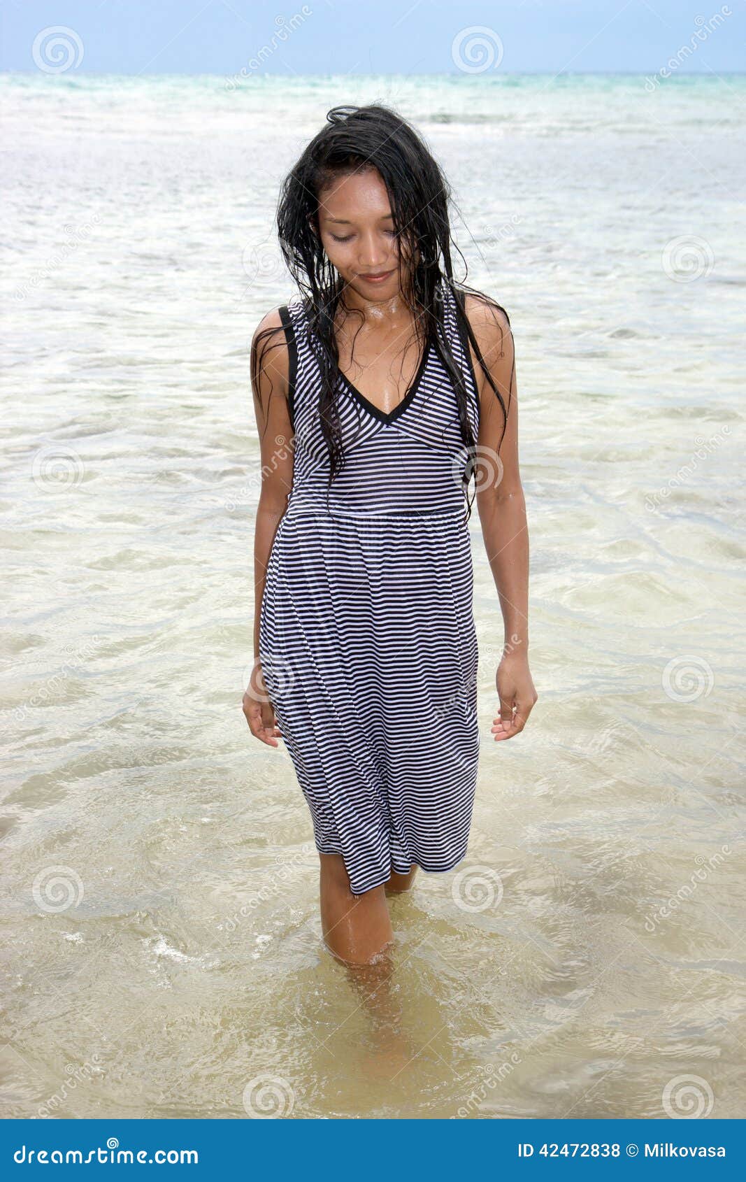 Happy Woman Walking in the Sea Stock Photo - Image of sunbathing ...