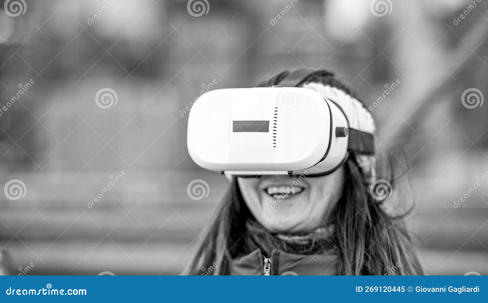 Happy Woman Wearing a Virtual Reality Visor Exploring the City ...