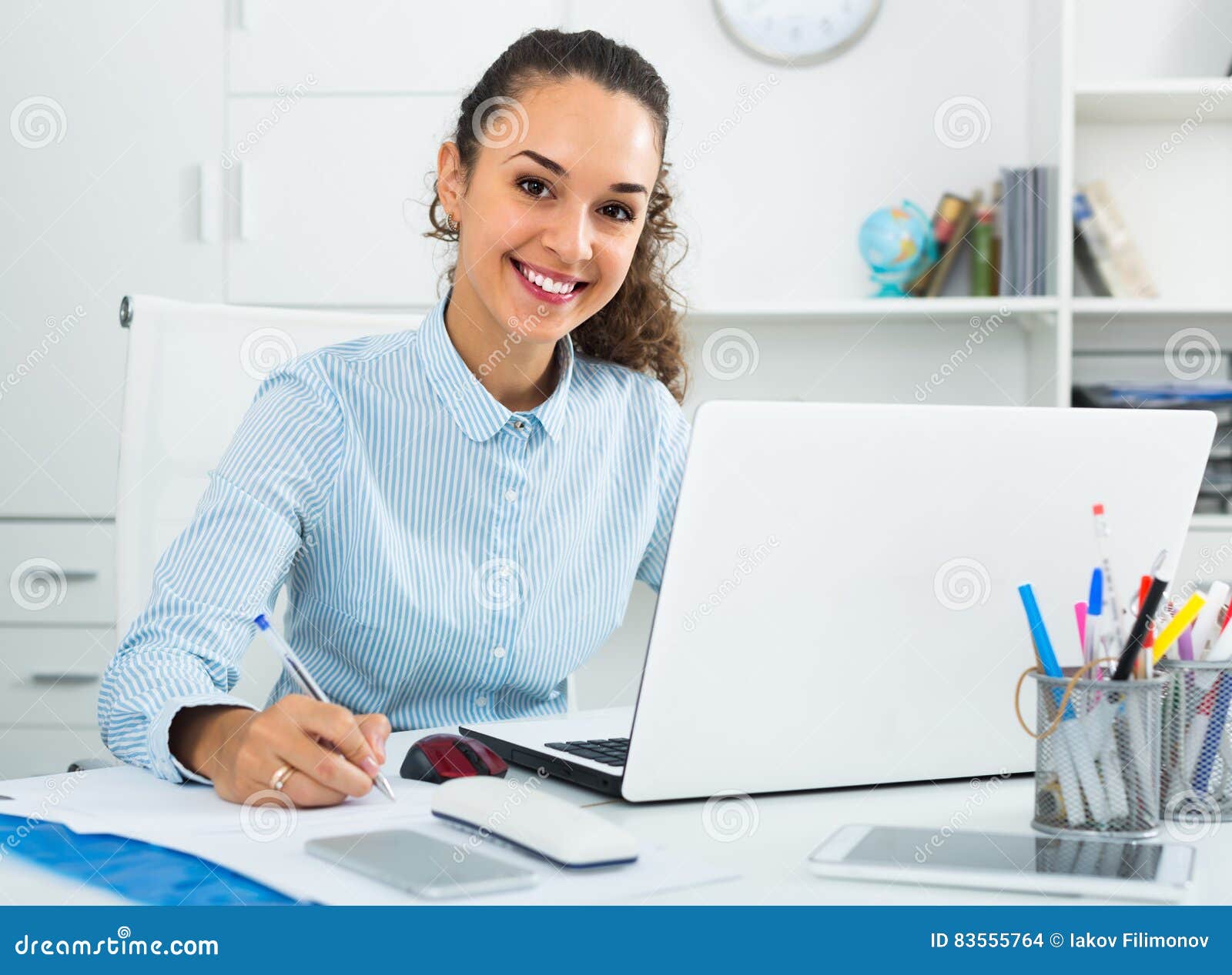 Happy Woman Working with Paperwork and Laptop Stock Photo - Image of ...