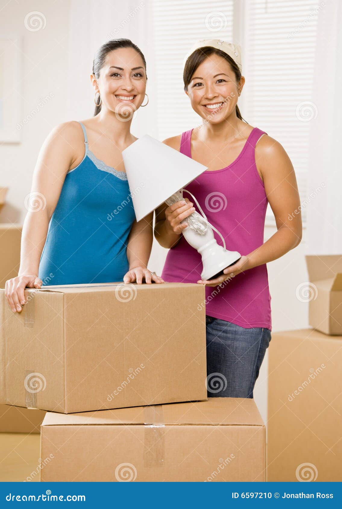 Happy Women Moving into New Home Stock Photo - Image of latin, looking ...