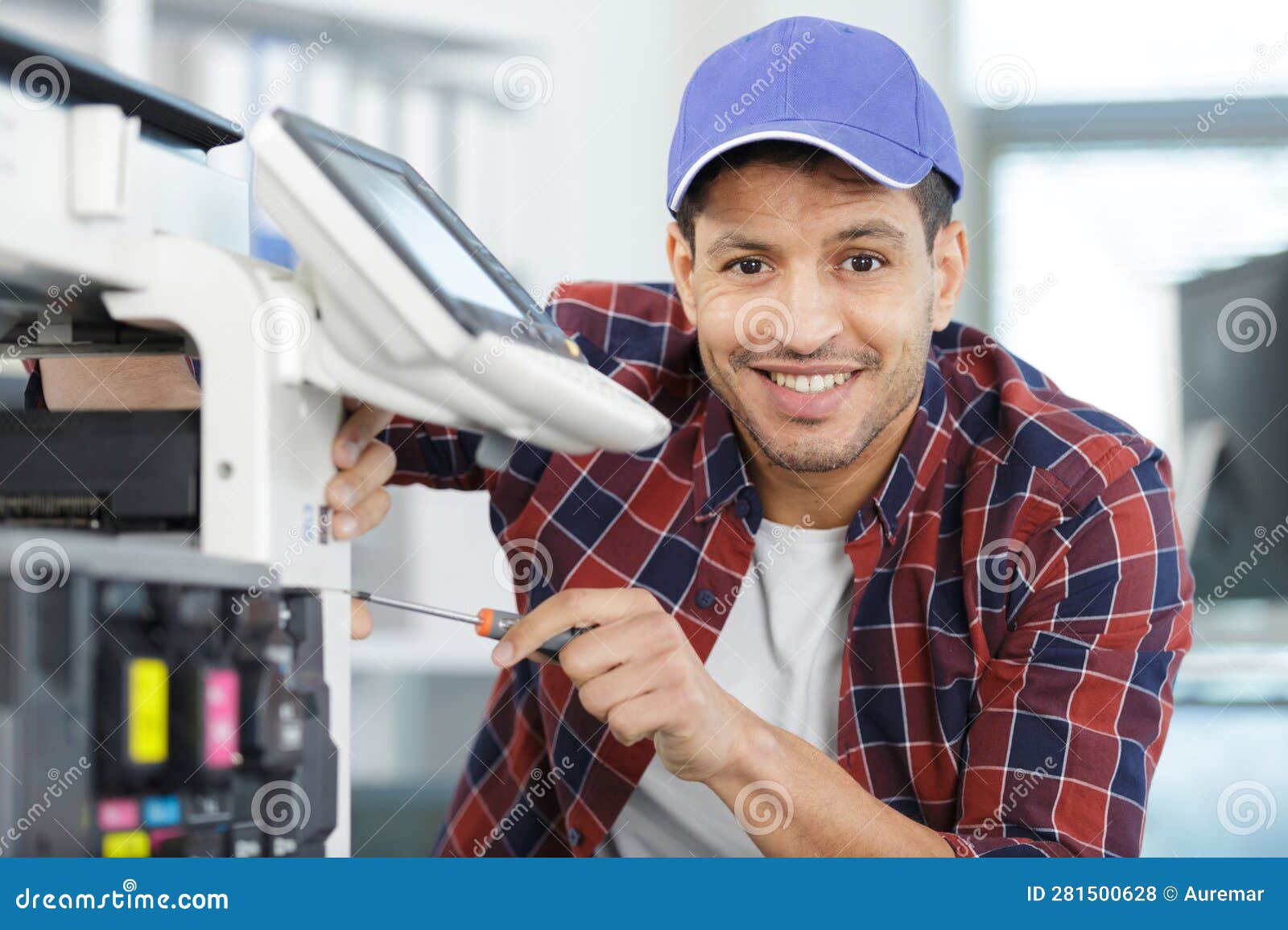 Happy Worker Holds Screwdriver for Fixing Printer Stock Photo - Image ...