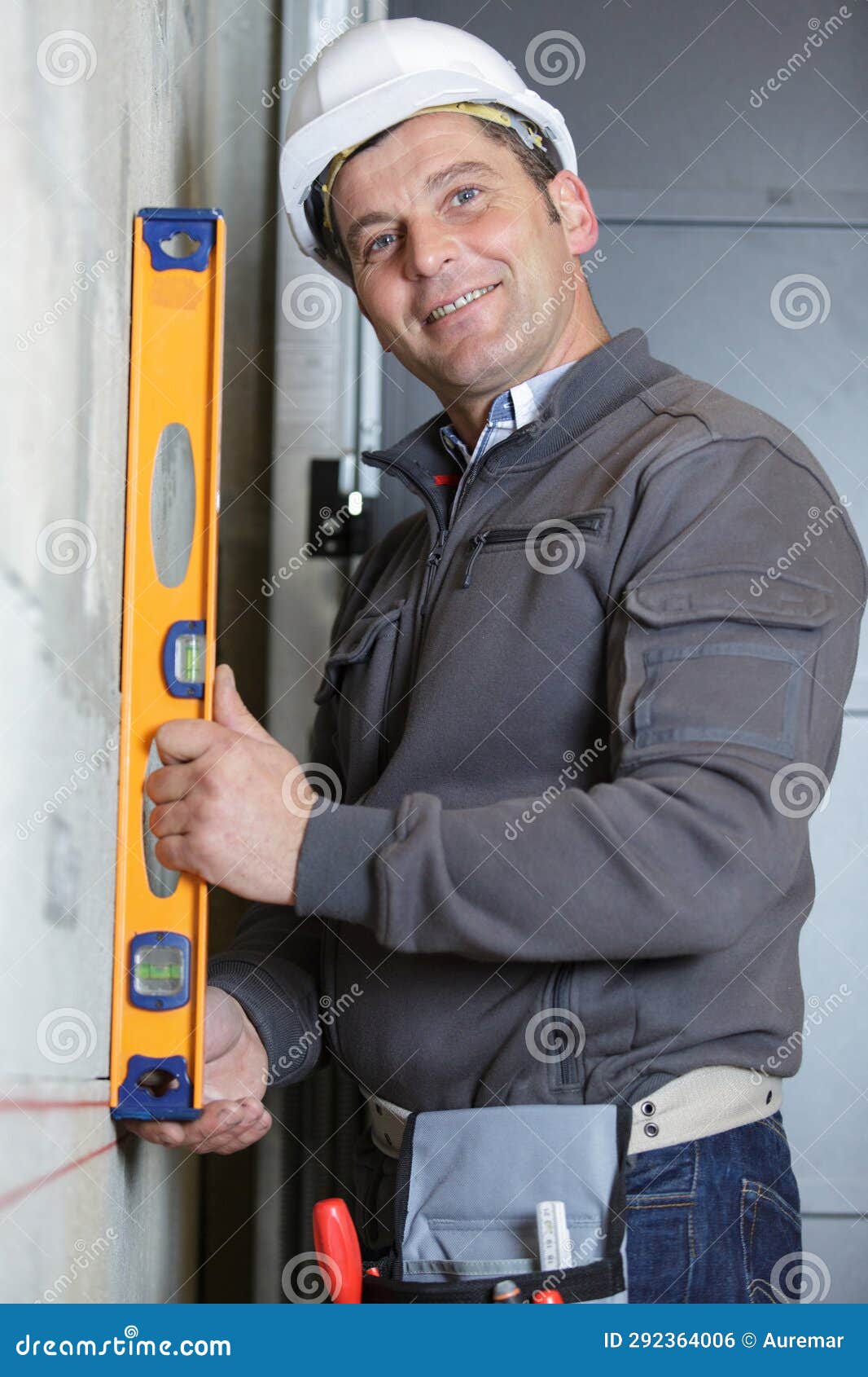Happy Worker Inspecting Window Sill Using Builders Level Stock Photo ...