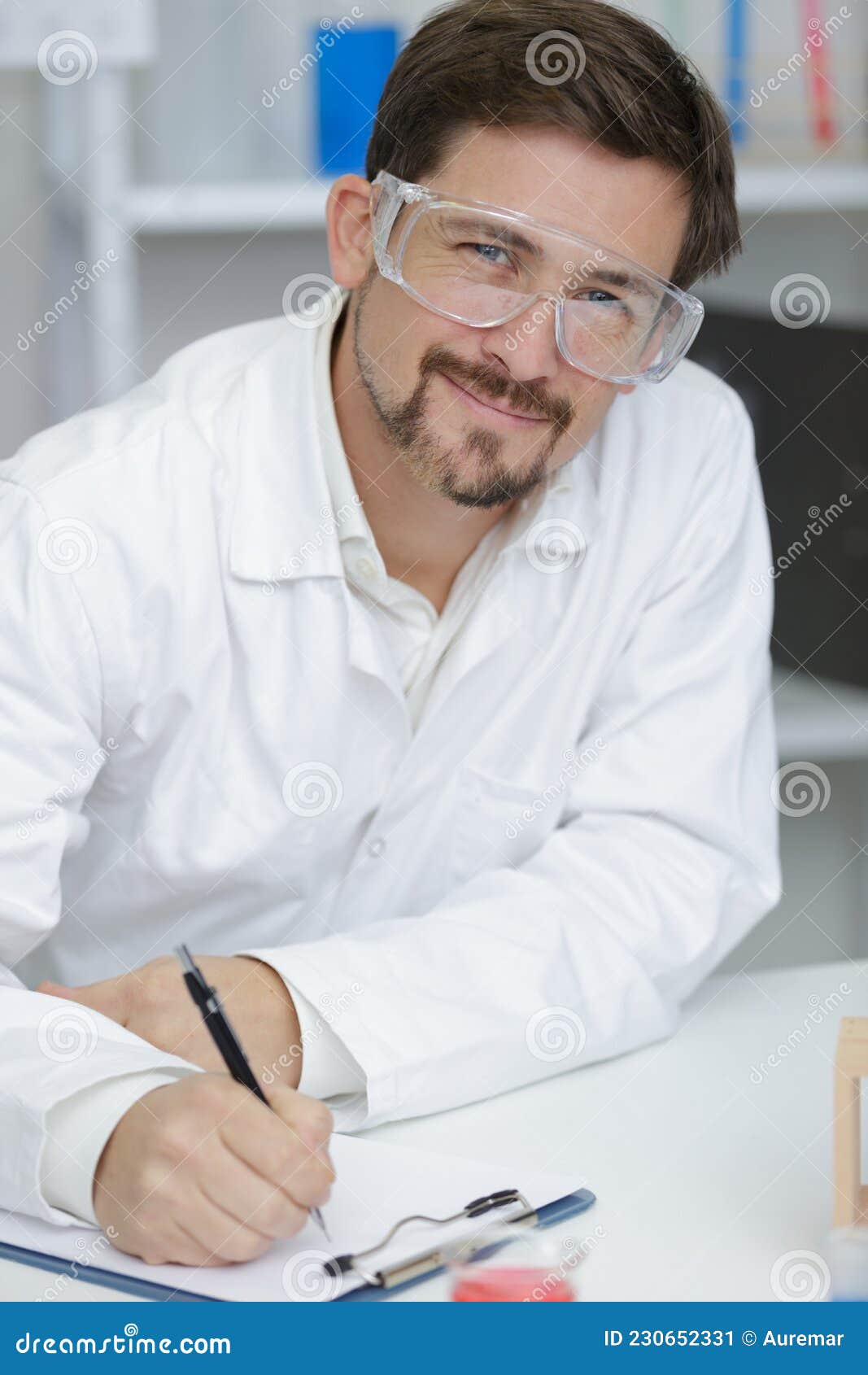 Happy worker in lab stock image. Image of closeup, glass - 230652331