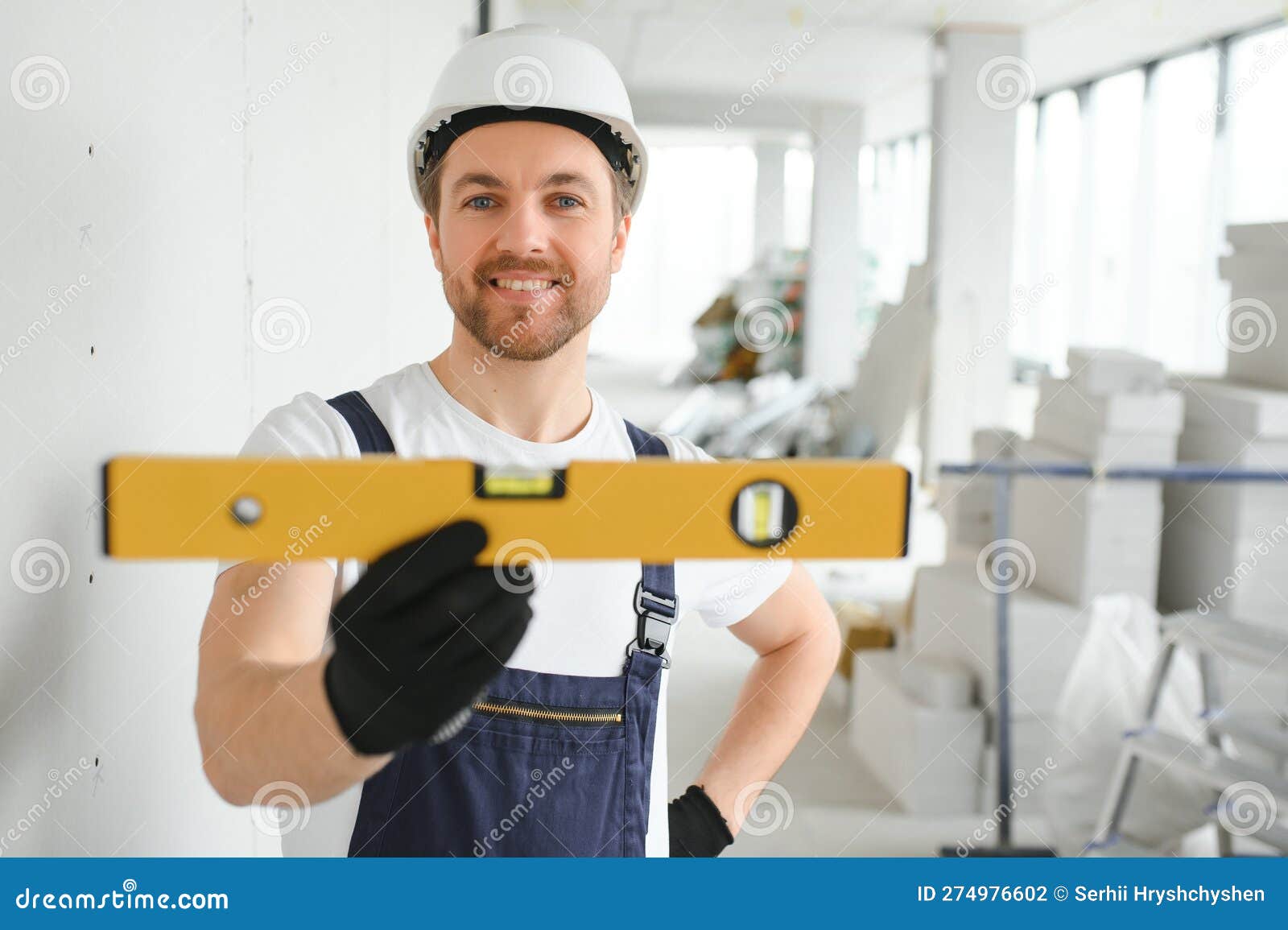A Happy Worker Proudly Standing at His Workplace. Stock Photo - Image ...