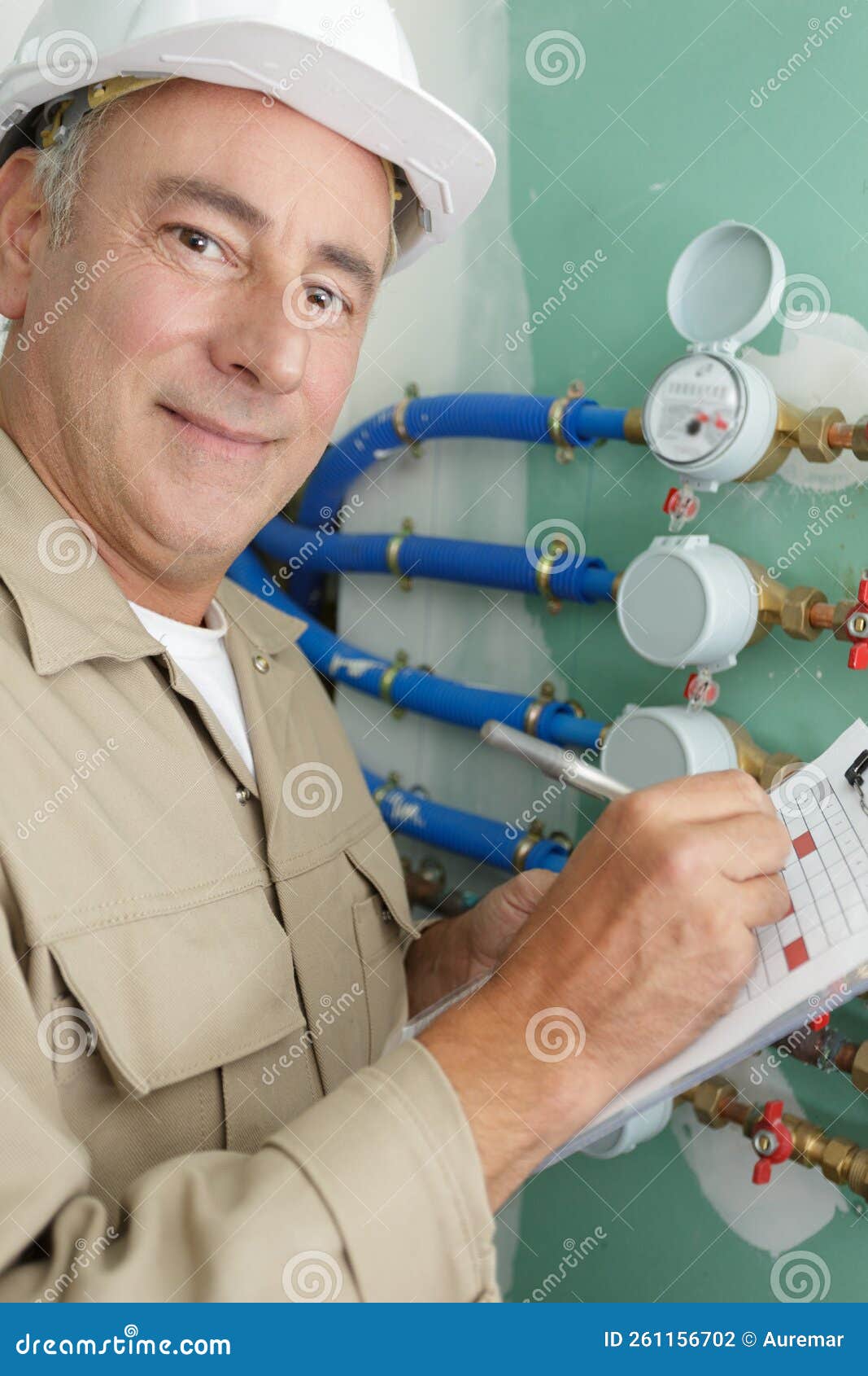 Happy Worker Reading Water Meters in House Stock Photo - Image of ...