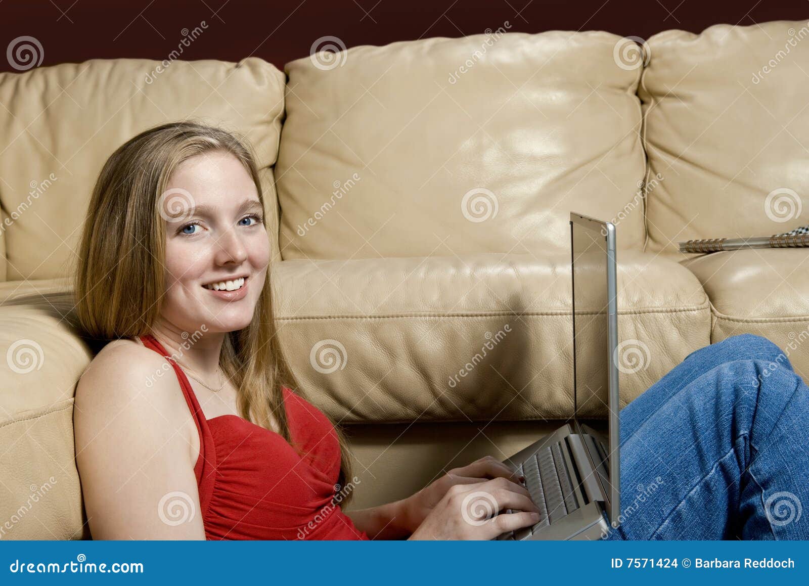 Happy Working at Her Laptop Stock Photo - Image of couch, leather: 7571424