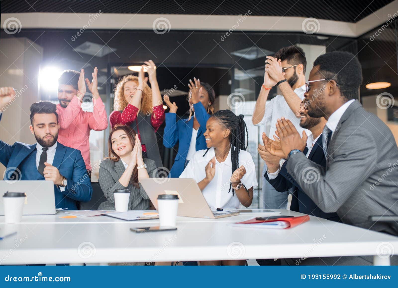 Happy Young Active Office Workers Applauding To Themselves Stock Photo ...