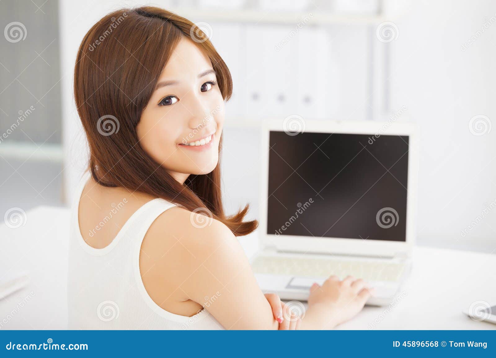 Happy Young Asian Woman Using a Laptop Stock Photo - Image of home ...