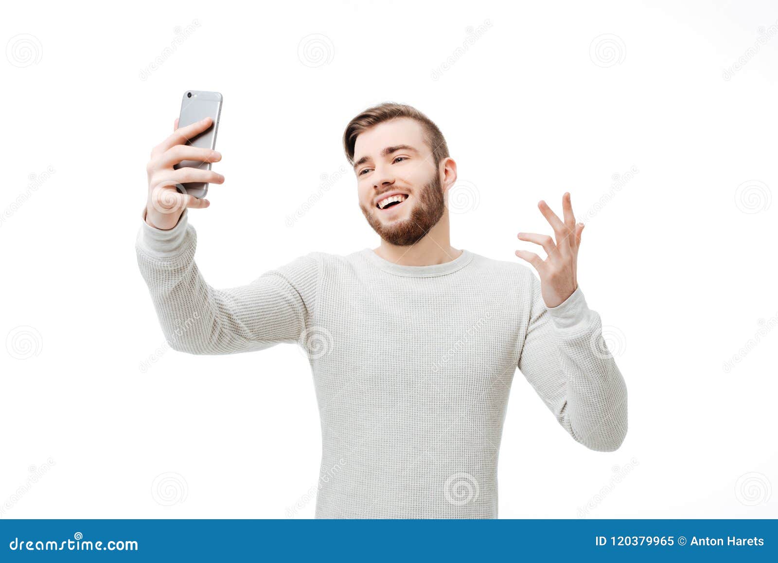 Happy Young Man Taking Selfie and Showing Why Gesture Over White ... Happy Young Man Taking Selfie and Showing Why Gesture Over White ...