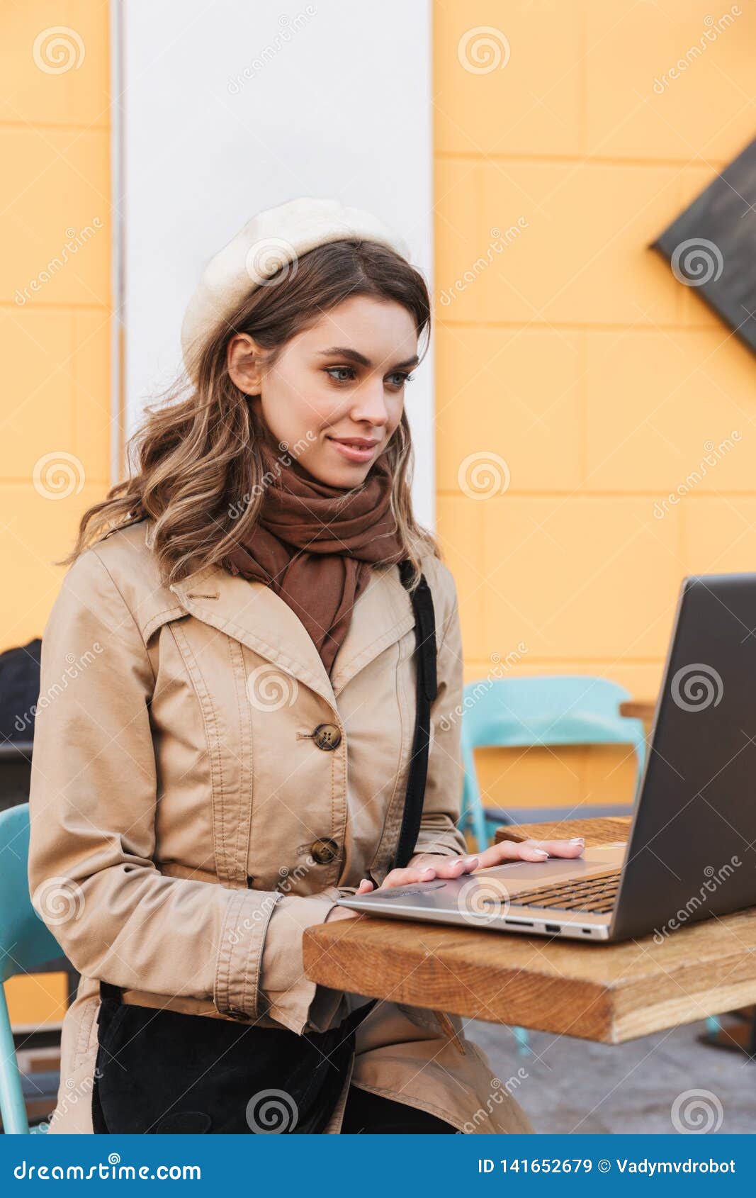 Happy Young Beautiful Woman Walking Outdoors Using Laptop Computer ...