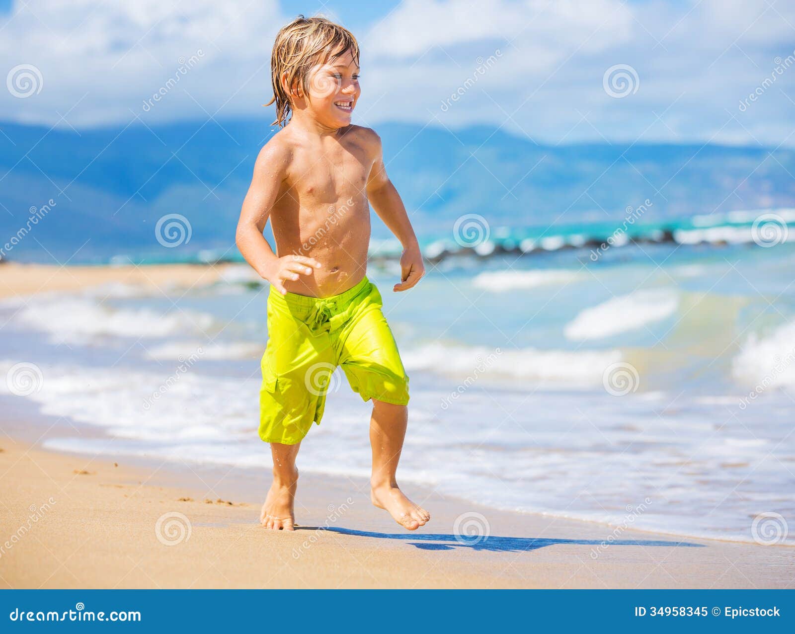 Happy Young Boy At The Beach Royalty Free Stock Photo - Image: 34958345