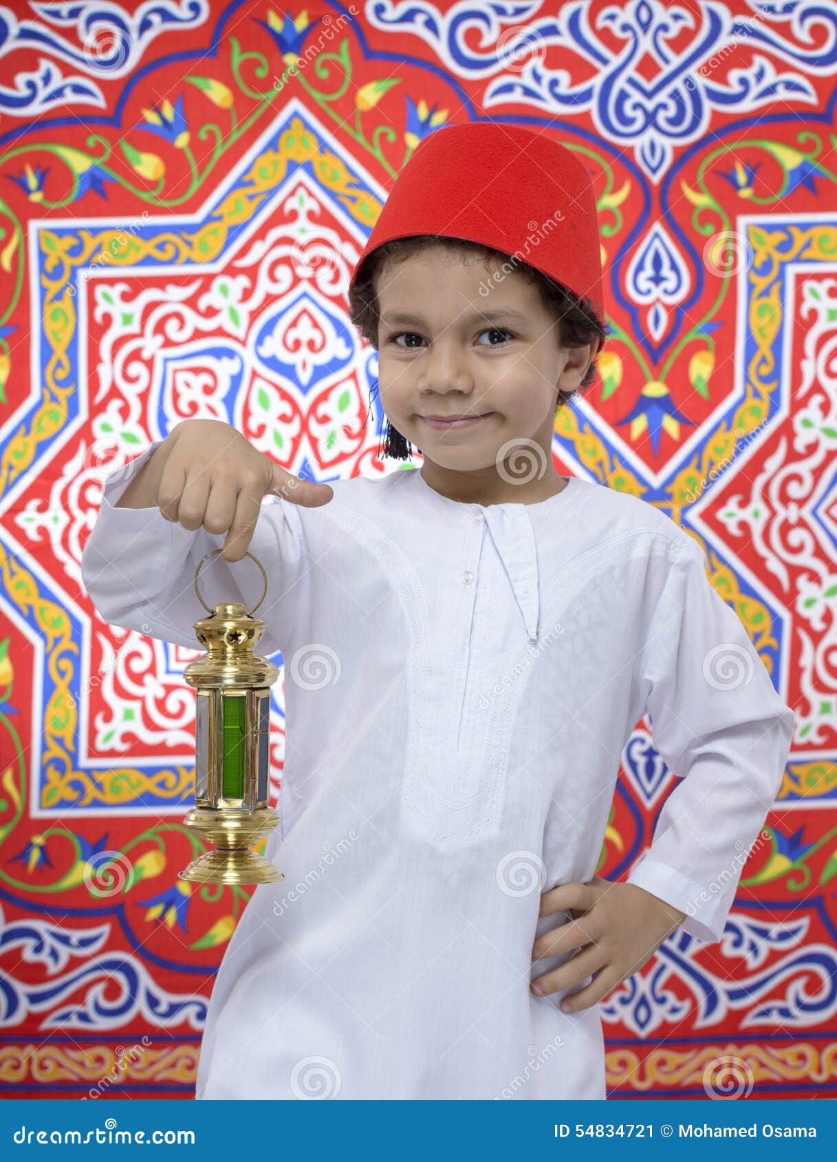 Happy Young Boy with Fez and Lantern Celebrating Ramadan Stock Image ...