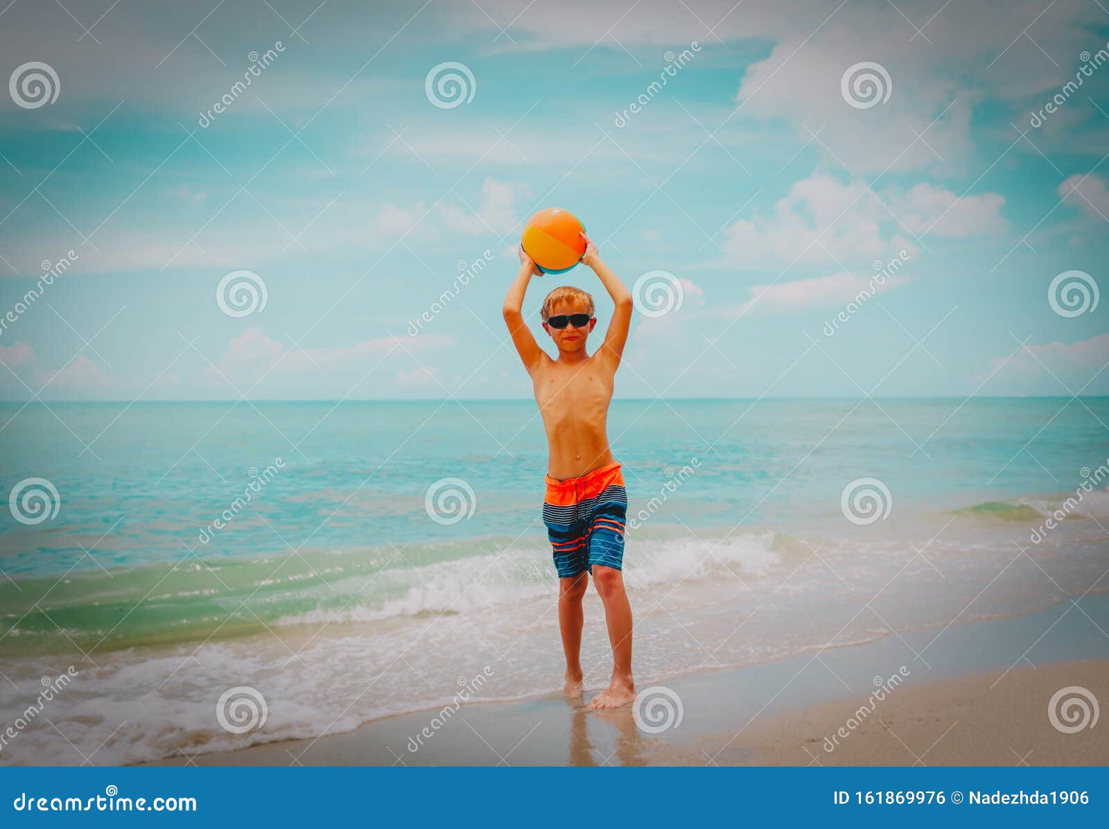 Happy Young Boy Play Ball on Beach Stock Photo - Image of active ...