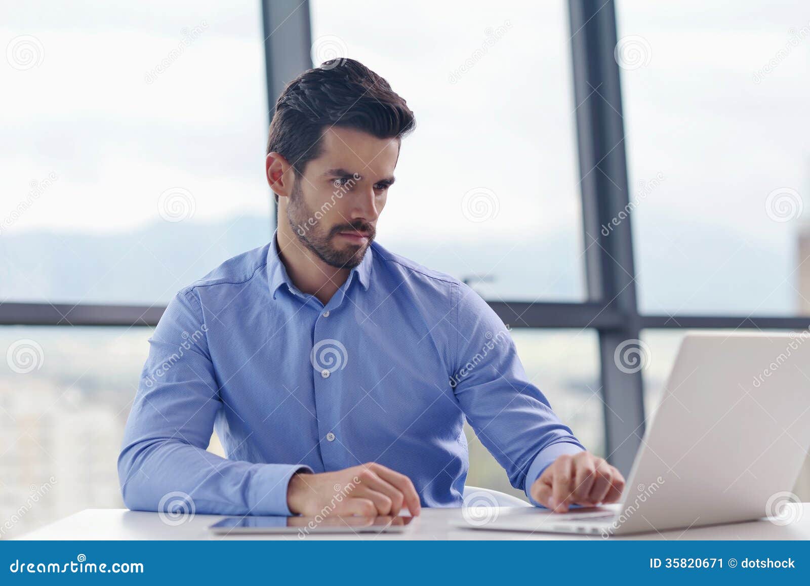 Happy Young Business Man at Office Stock Image - Image of businessman ...