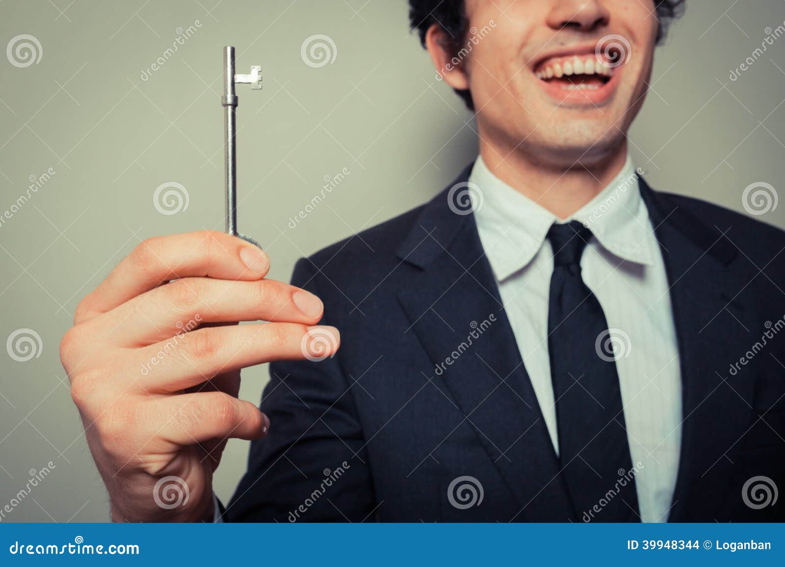 Happy Young Businessman with Key Stock Photo - Image of finance, symbol ...