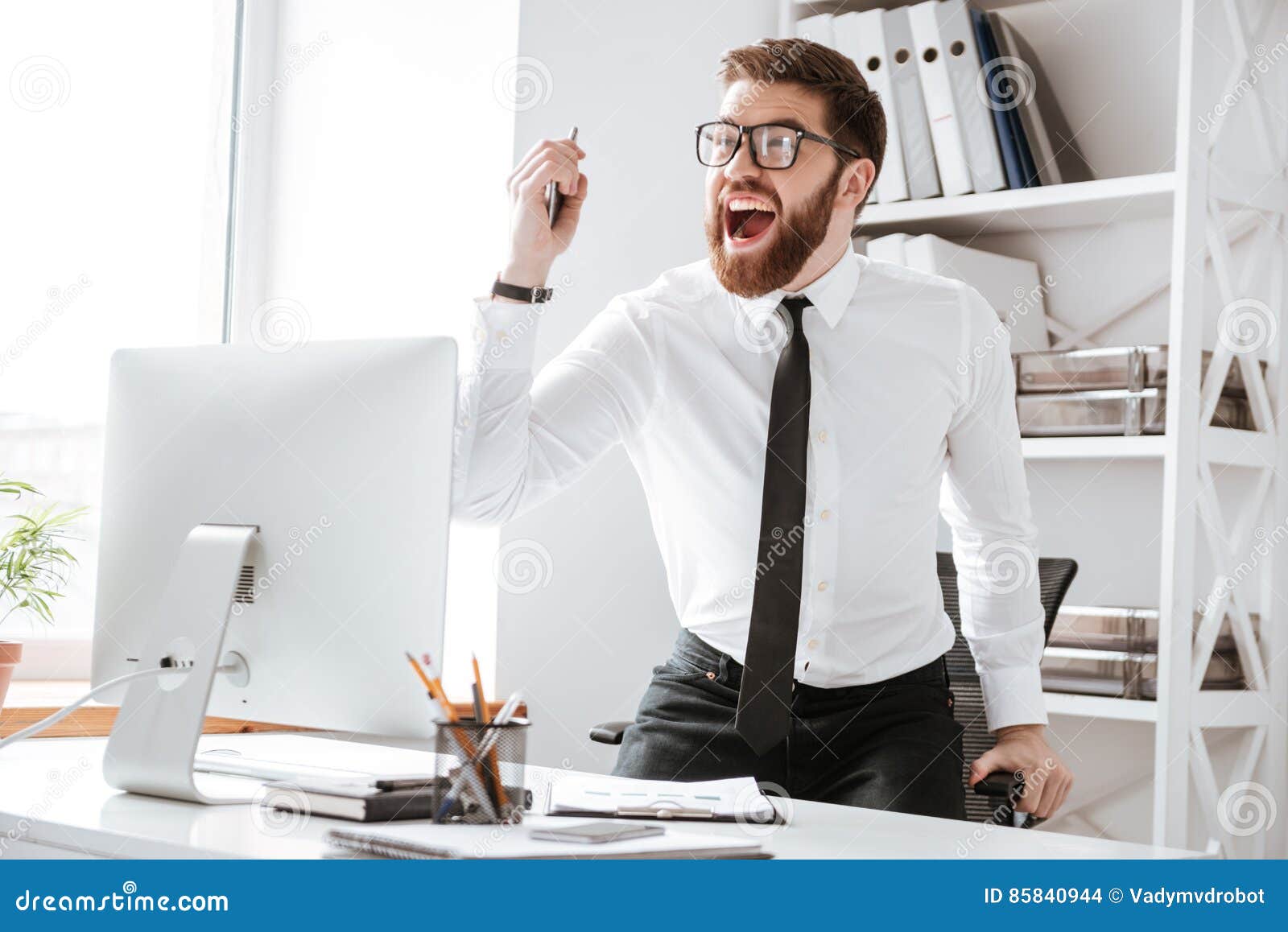 Happy Young Businessman Make Winner Gesture. Stock Photo - Image of ...