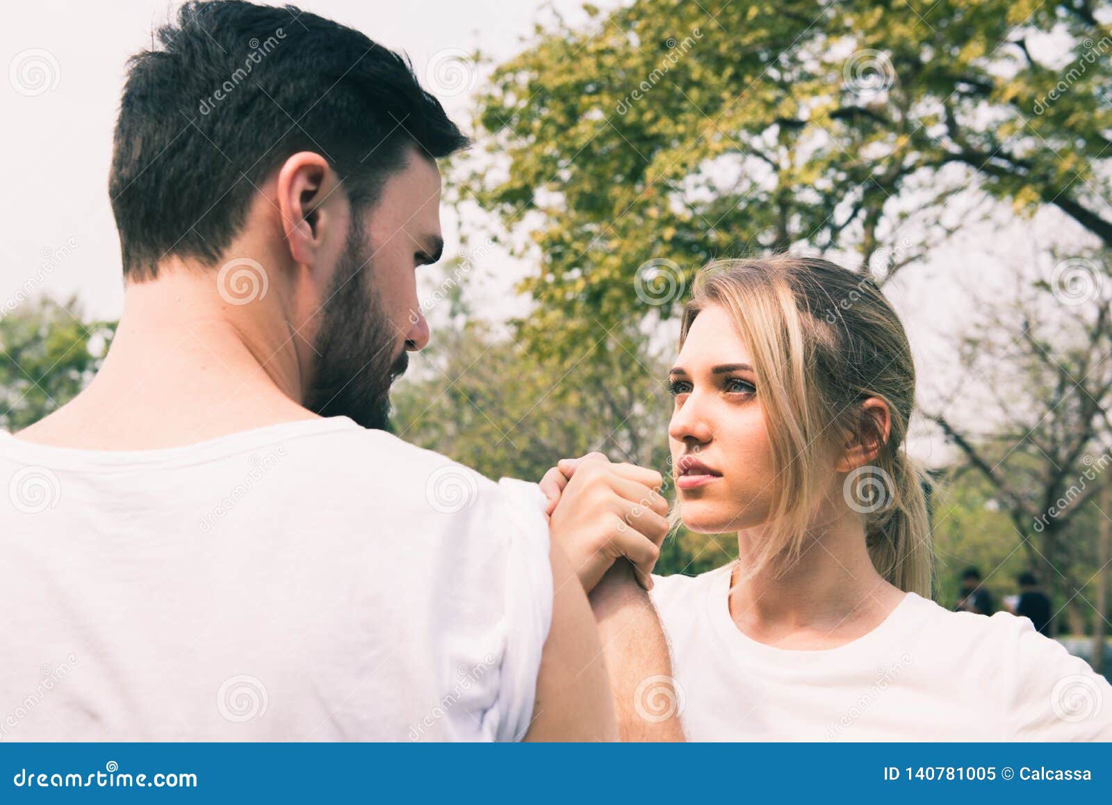 Happy Young Couple Arm Restling in the Park Stock Image - Image of ...