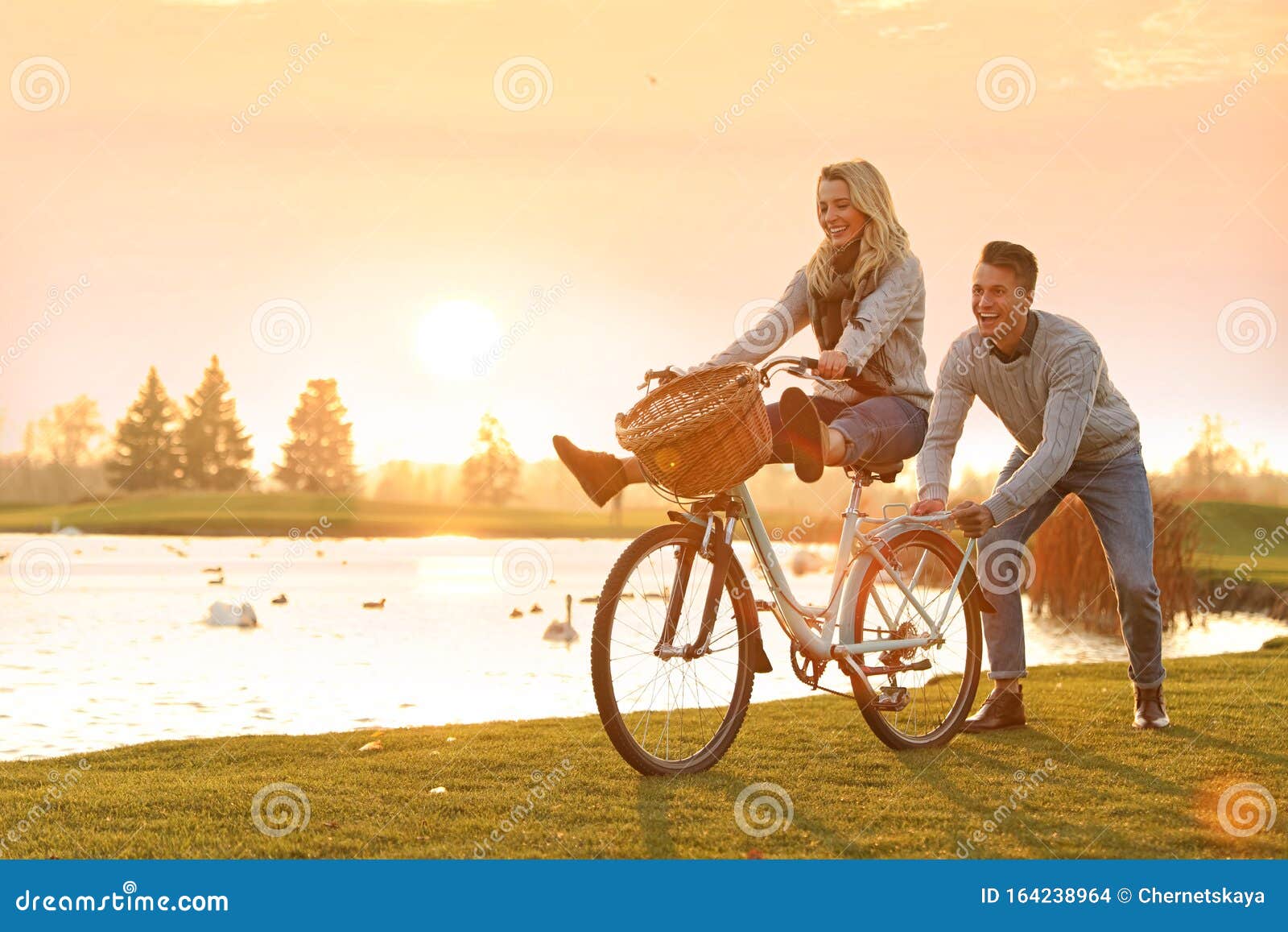 Happy Young Couple with Bicycle Having Fun. Time for Picnic Stock Photo ...