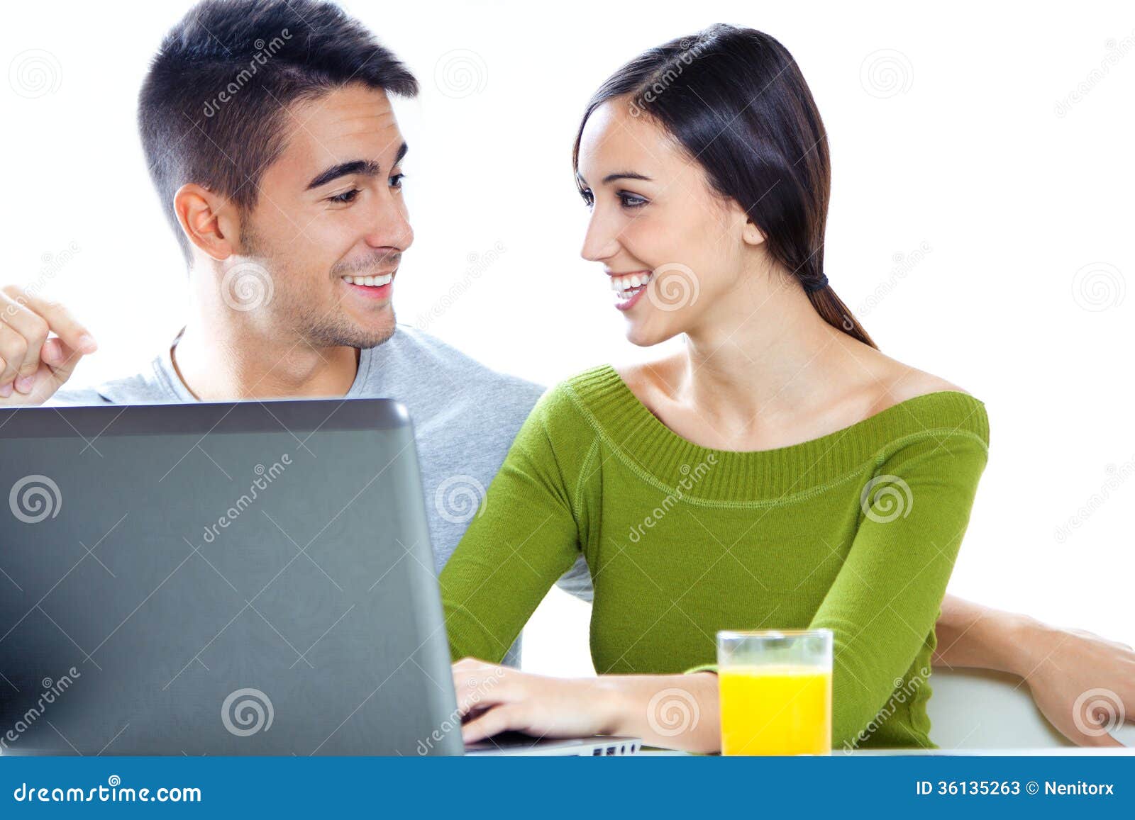 Happy Young Couple Browsing Internet at Home Stock Image - Image of ...
