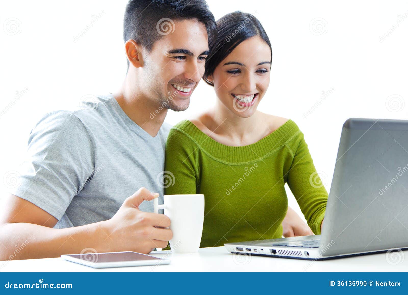 Happy Young Couple Browsing Internet at Home Stock Photo - Image of ...