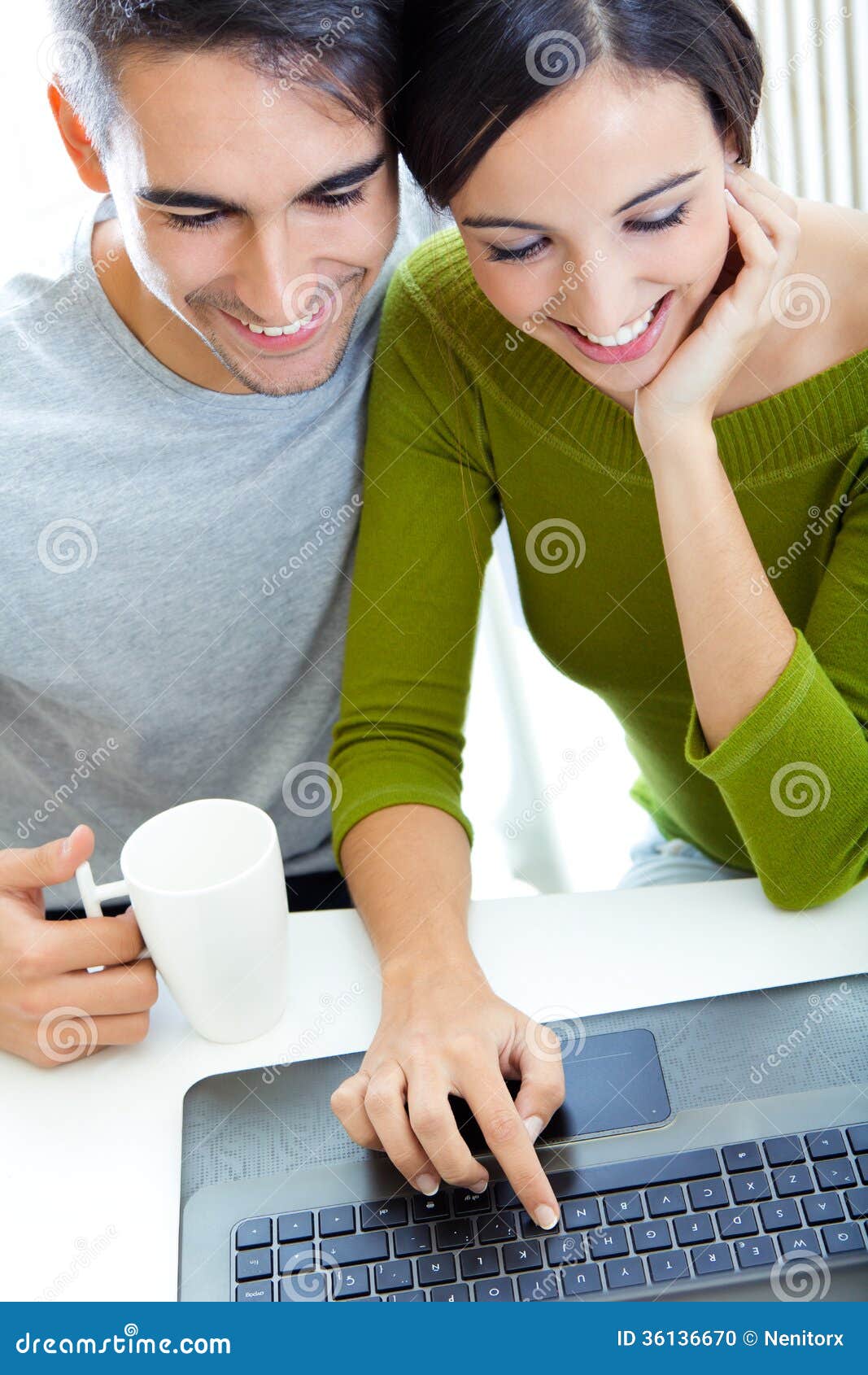 Happy Young Couple Browsing Internet at Home Stock Photo - Image of ...