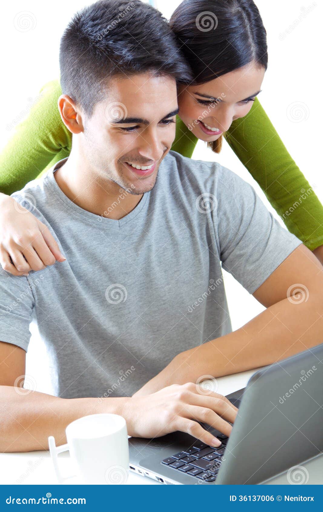 Happy Young Couple Browsing Internet at Home Stock Photo - Image of ...