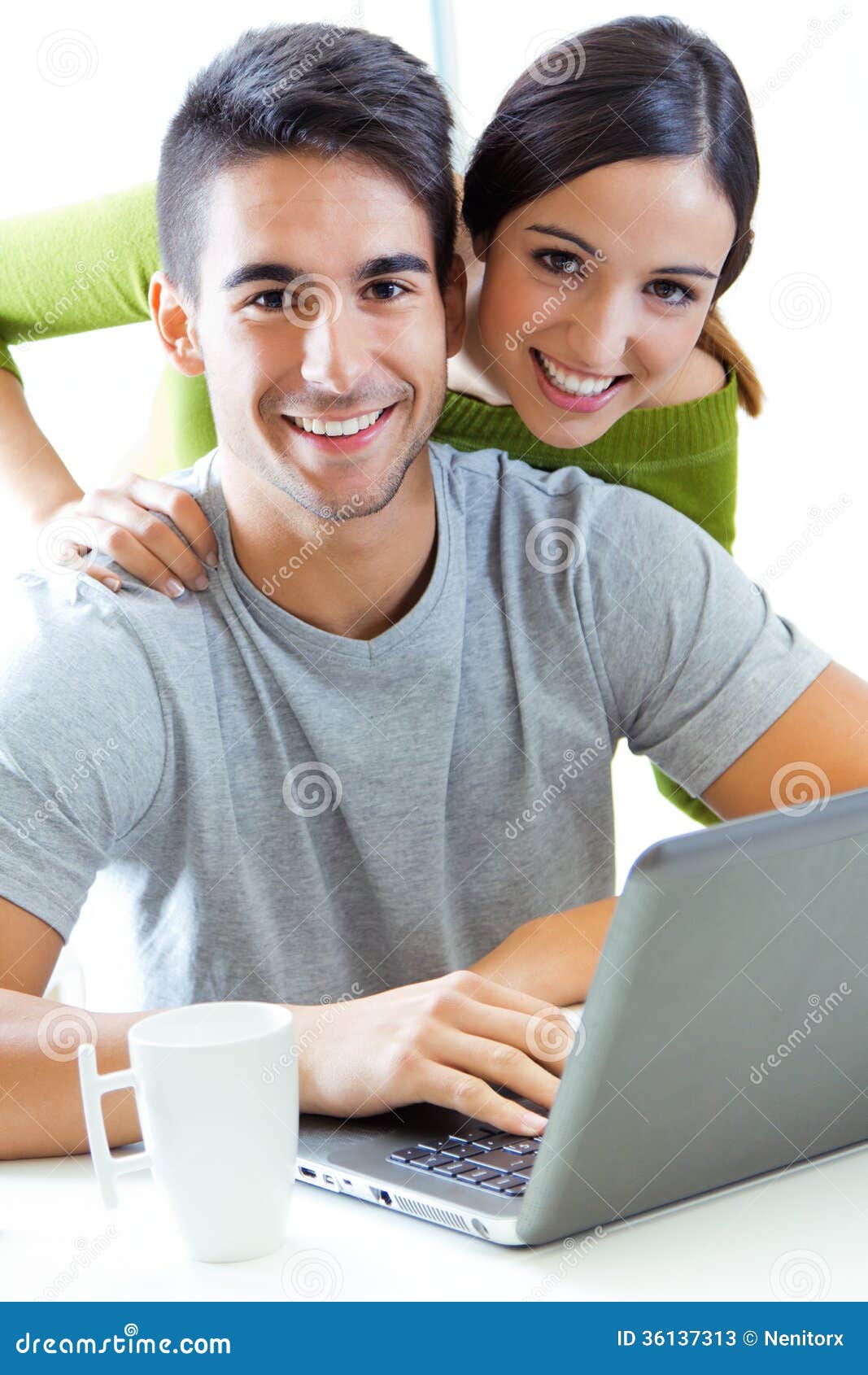 Happy Young Couple Browsing Internet at Home Stock Image - Image of ...