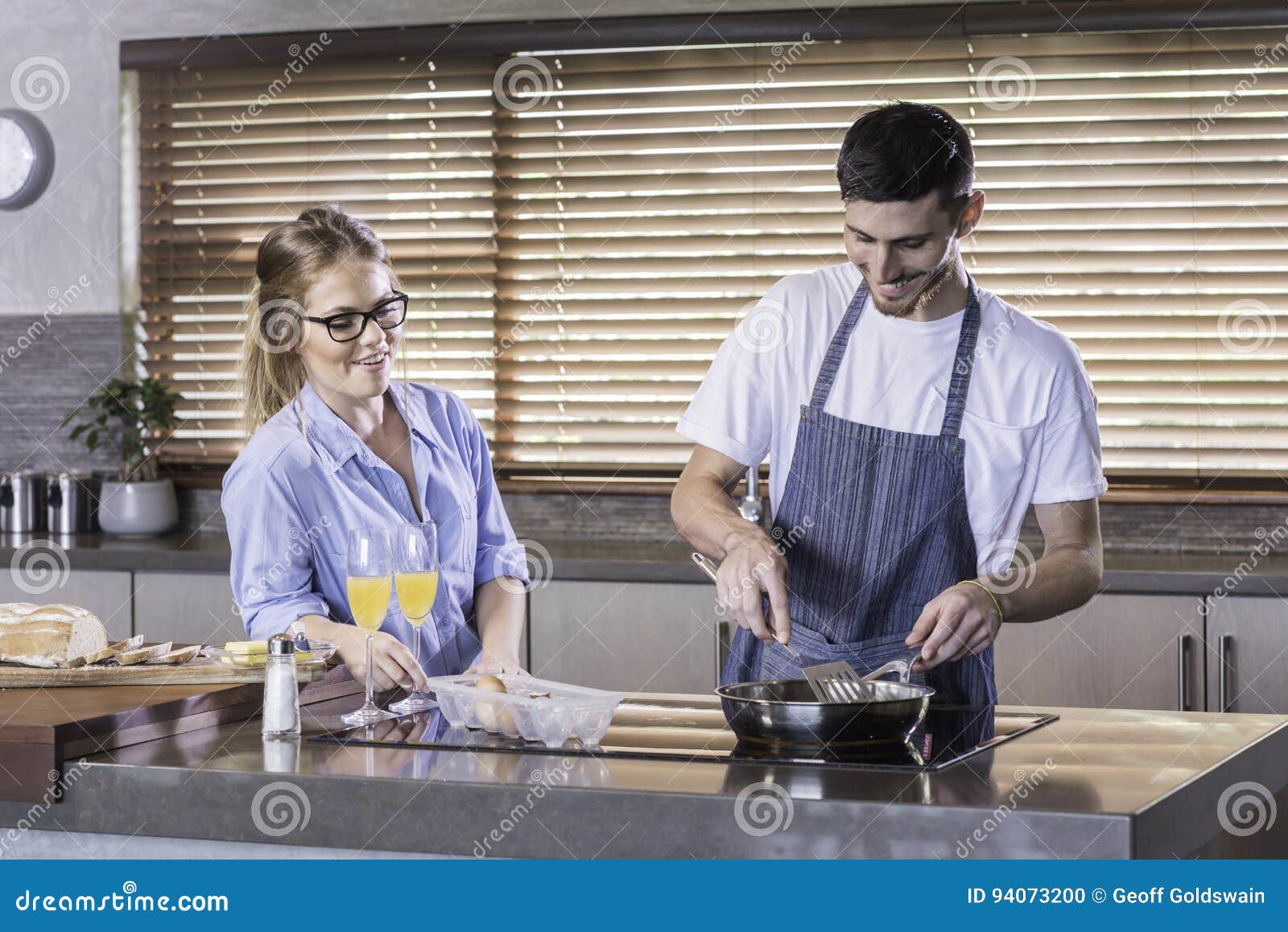 Happy Young Couple Cooking Breakfast Preparing in the Kitchen Stock ...