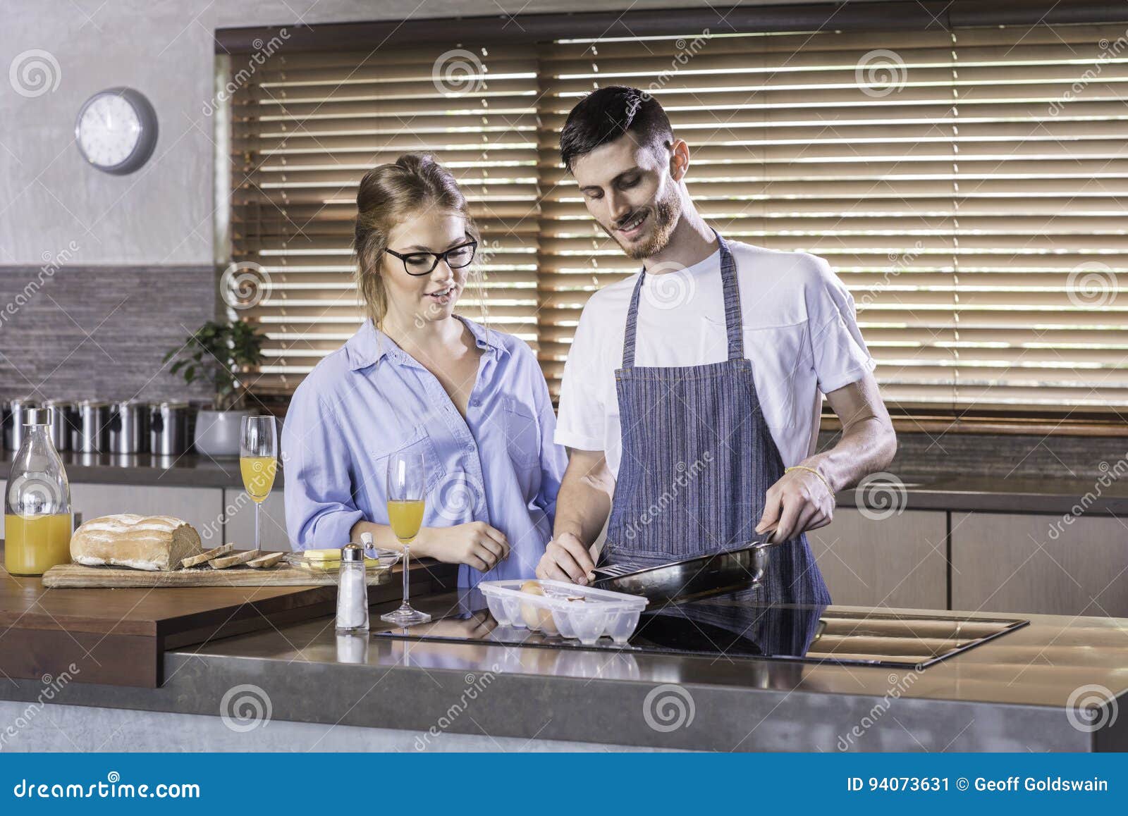 Happy Young Couple Cooking Breakfast Preparing in the Kitchen Stock ...
