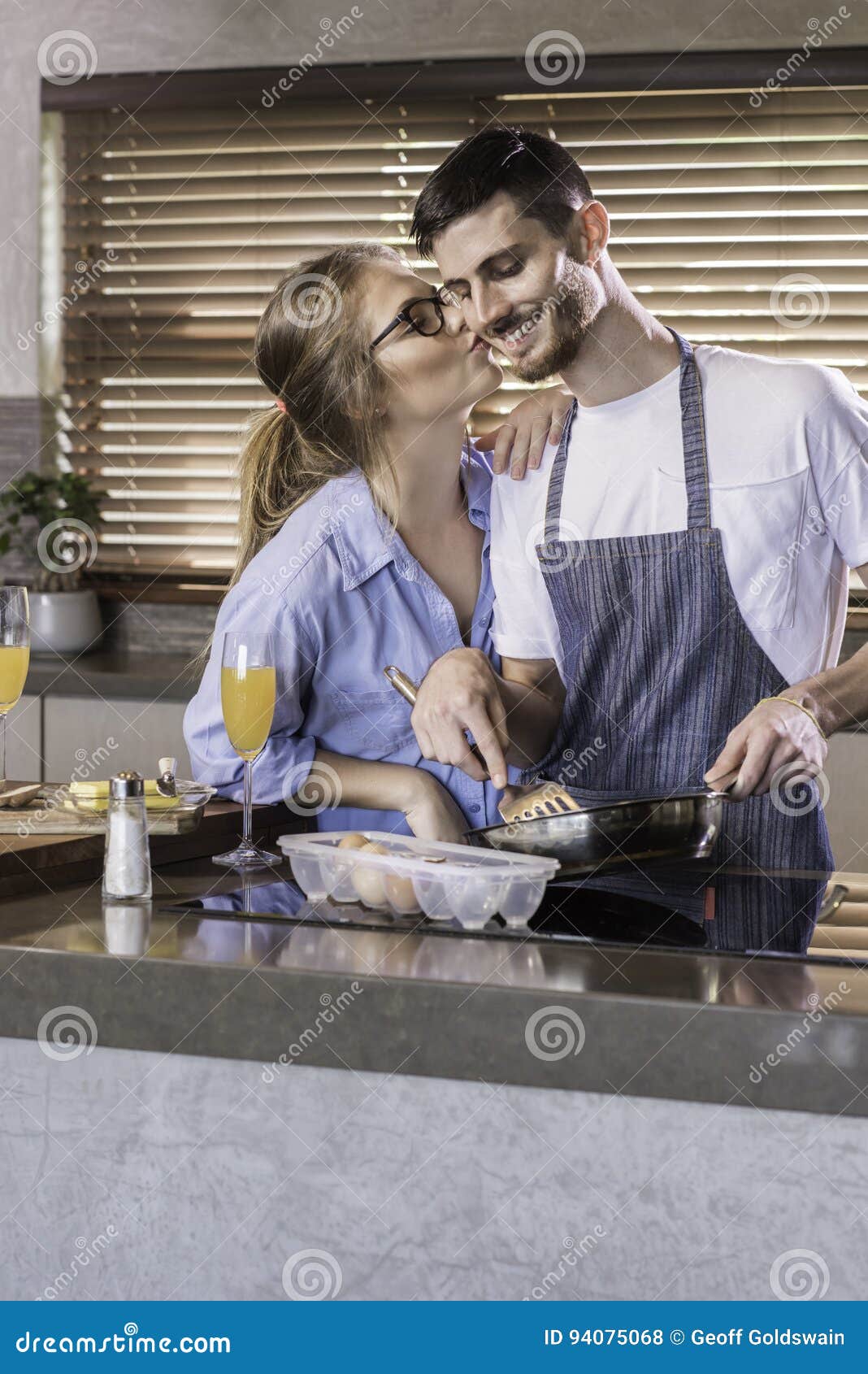 Happy Young Couple Cooking Breakfast Preparing in the Kitchen Stock ...