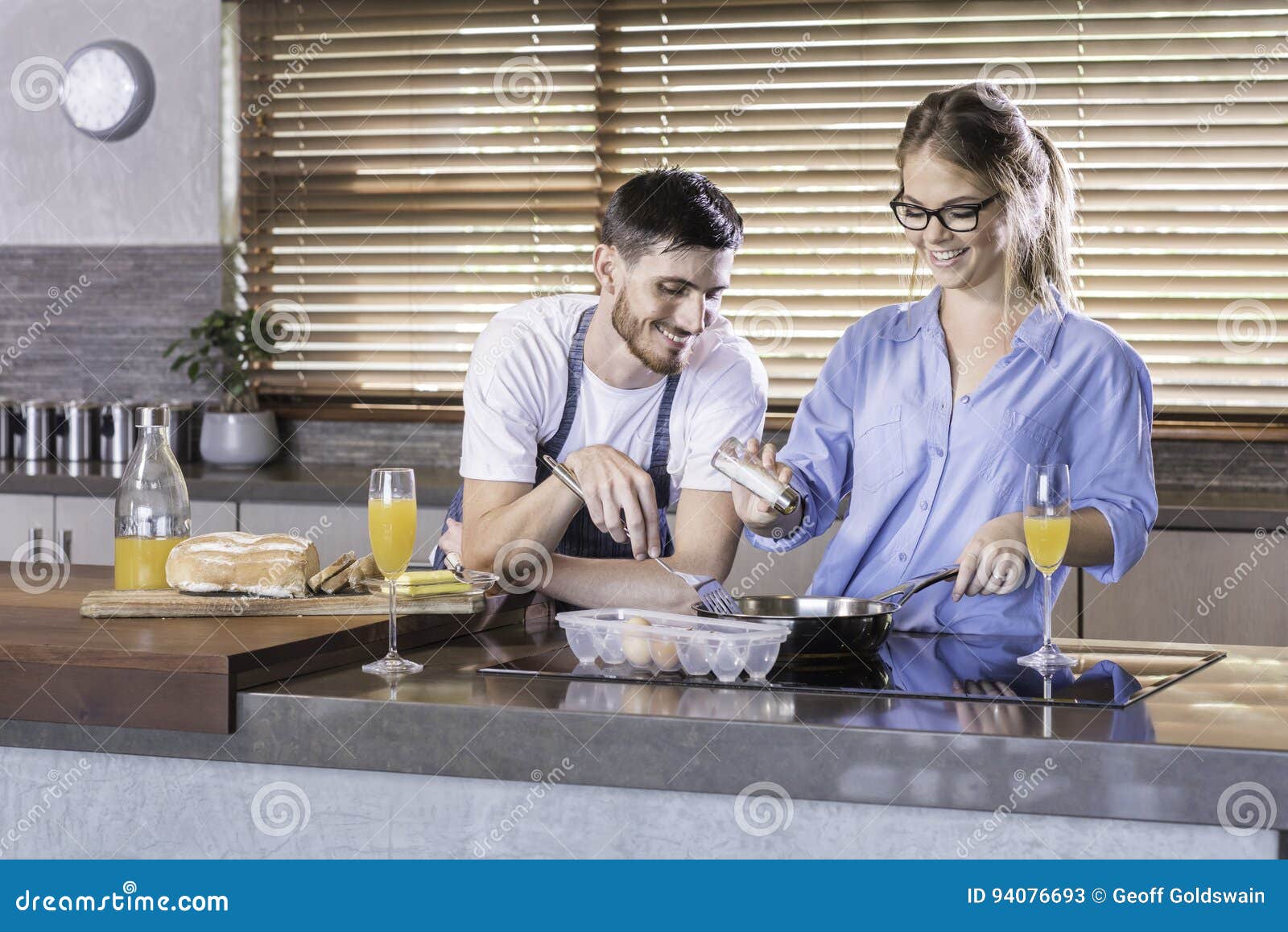 Happy Young Couple Cooking Breakfast Preparing in the Kitchen Stock ...