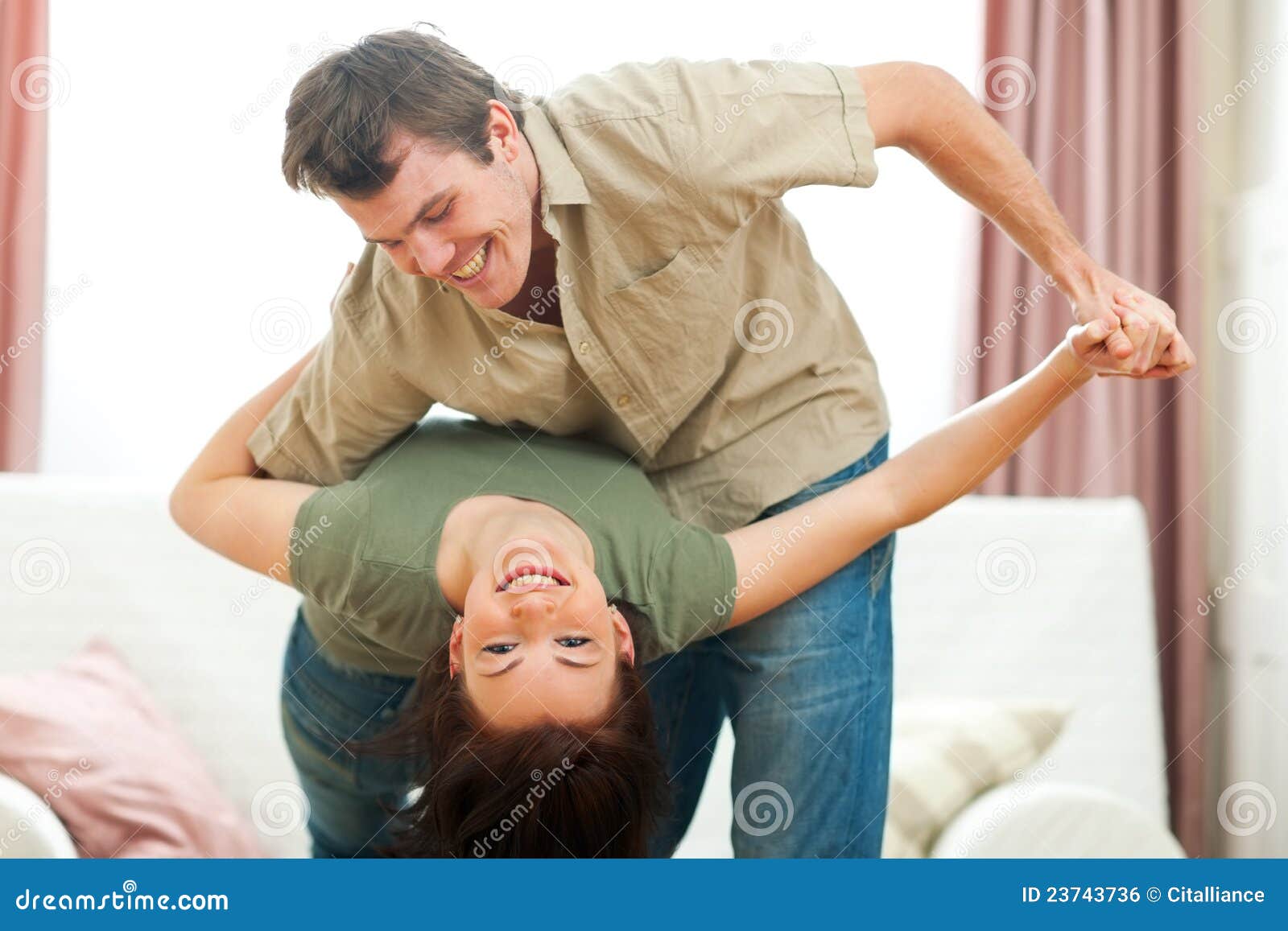 Happy young couple dancing stock photo. Image of romance - 23743736