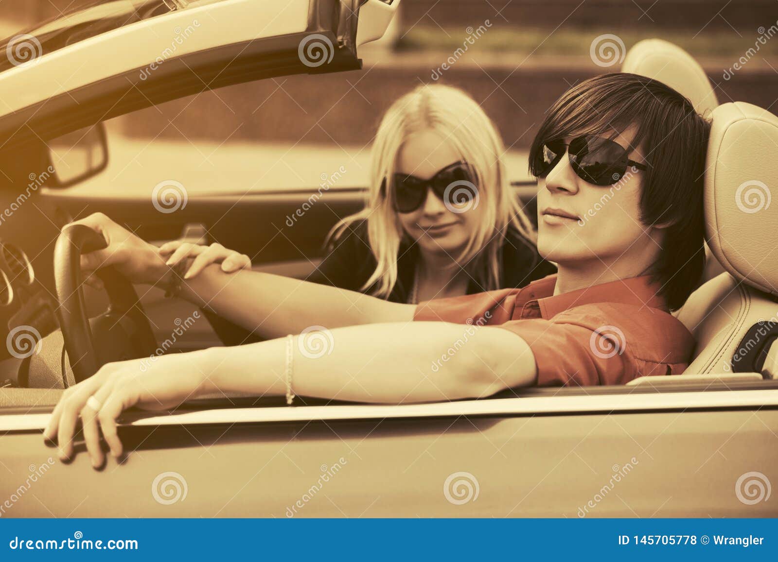 Happy Young Couple Driving Convertible Car Stock Photo - Image of ...