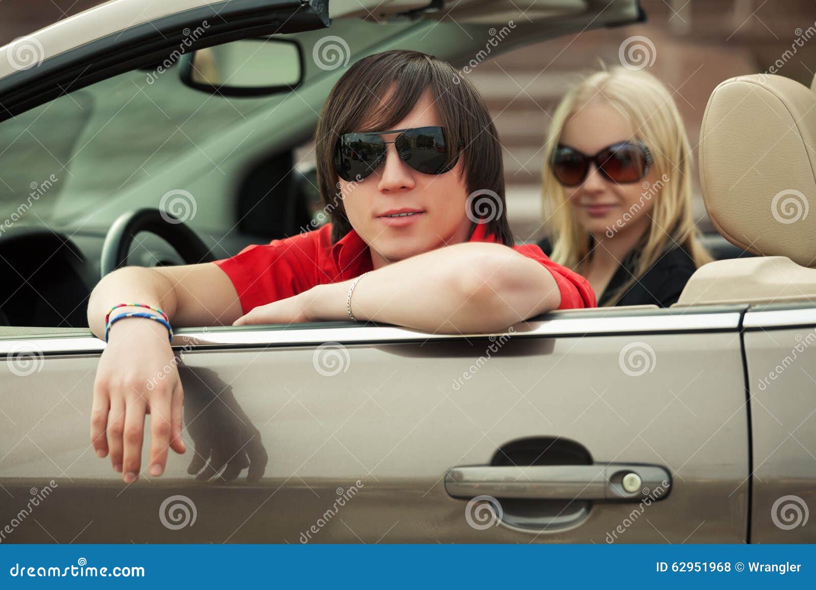 Happy Young Couple Driving Convertible Car Stock Photo - Image of ...