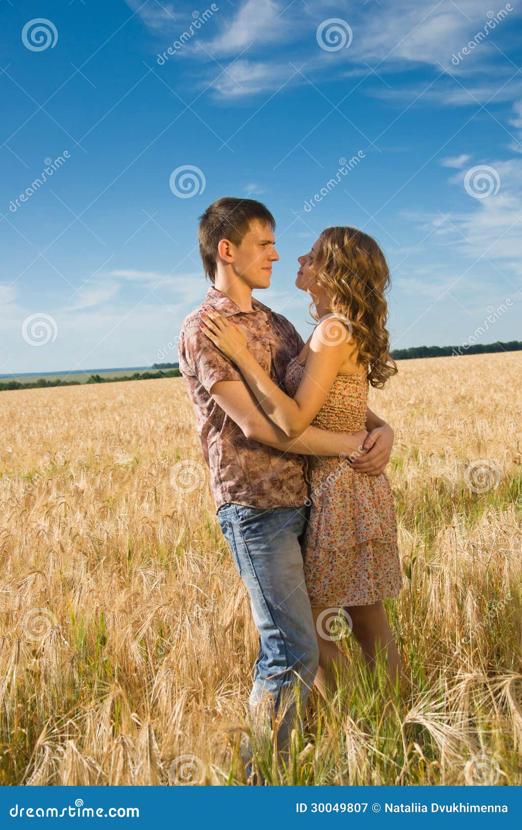 Loving Couple on Wheat Field Stock Image - Image of embrace, girl: 30049807