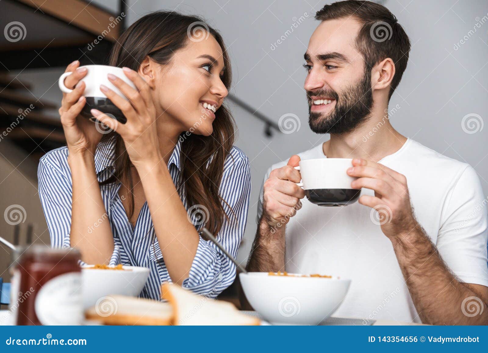 Happy Young Couple Having Breakfast Stock Photo - Image of couple ...