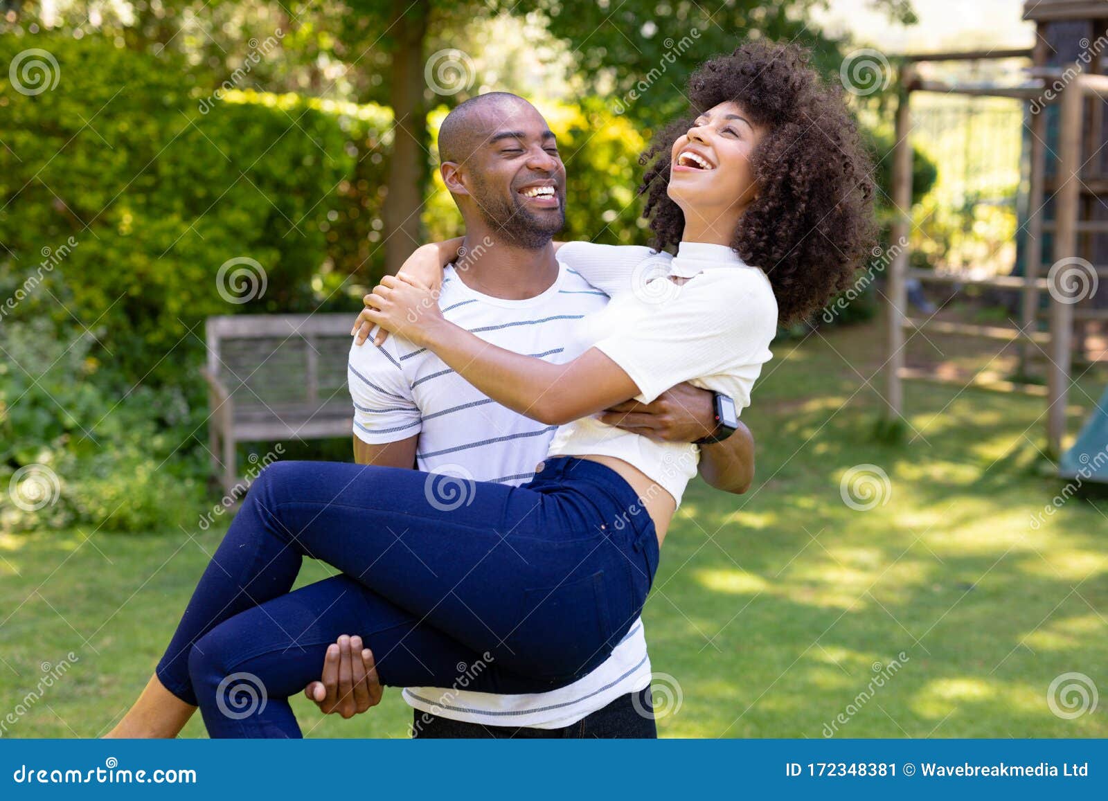 Happy Young Couple Holding Each Other In The Garden Stock Image Image