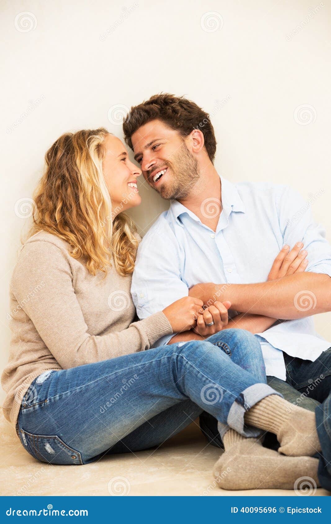 Happy young couple at home stock photo. Image of home - 40095696