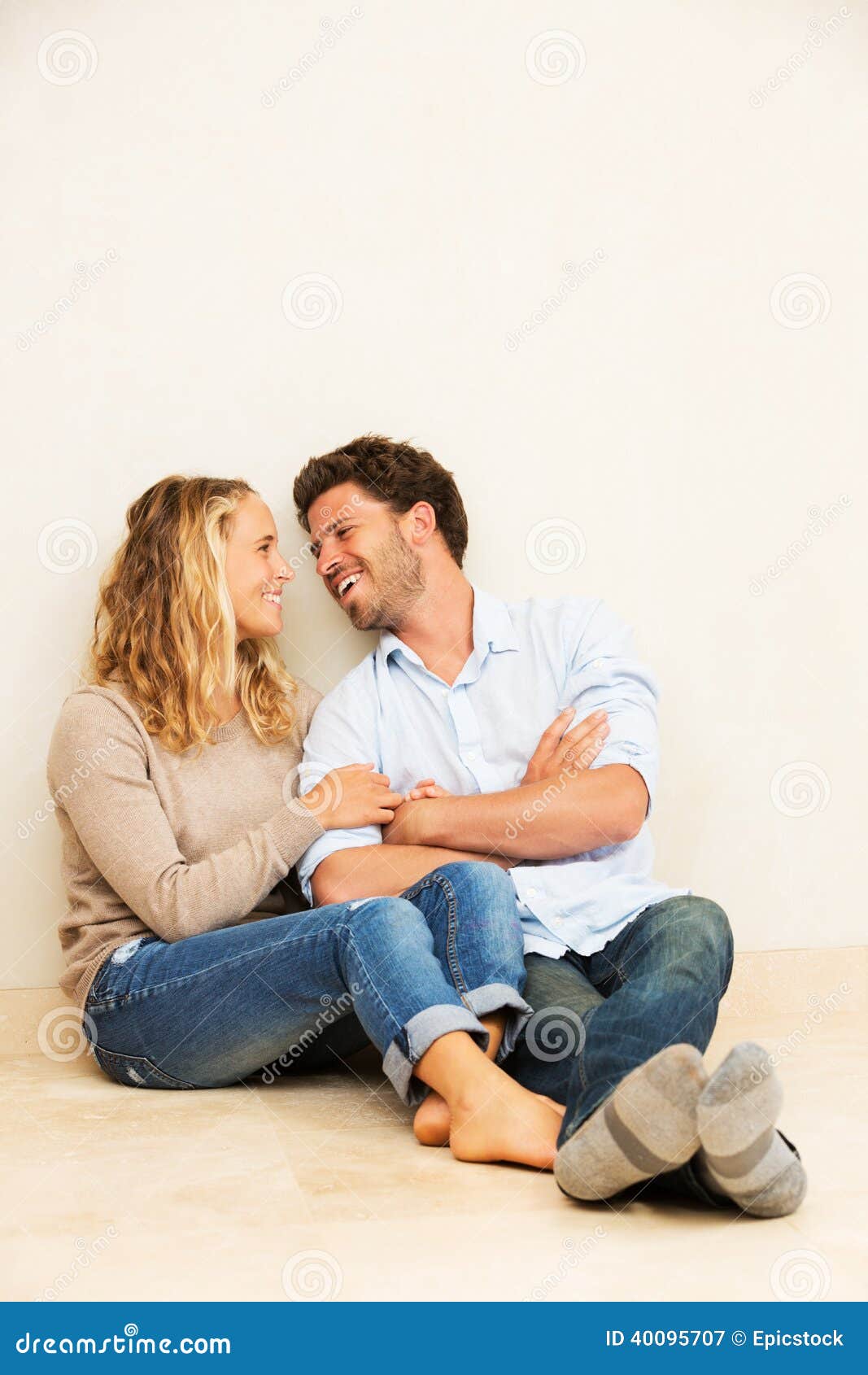 Happy young couple at home stock image. Image of apartment - 40095707