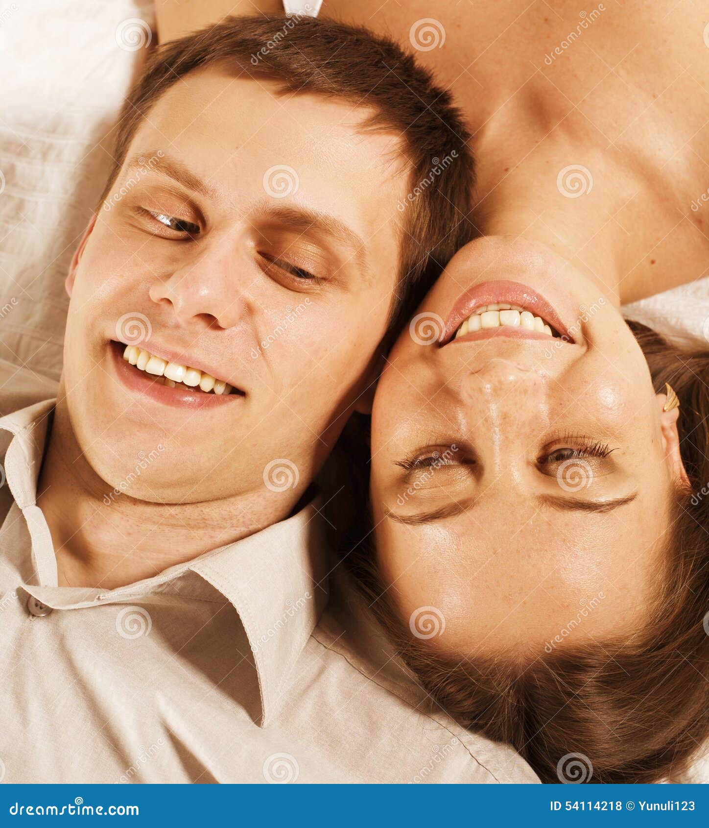 Happy young couple at home stock photo. Image of couple - 54114218