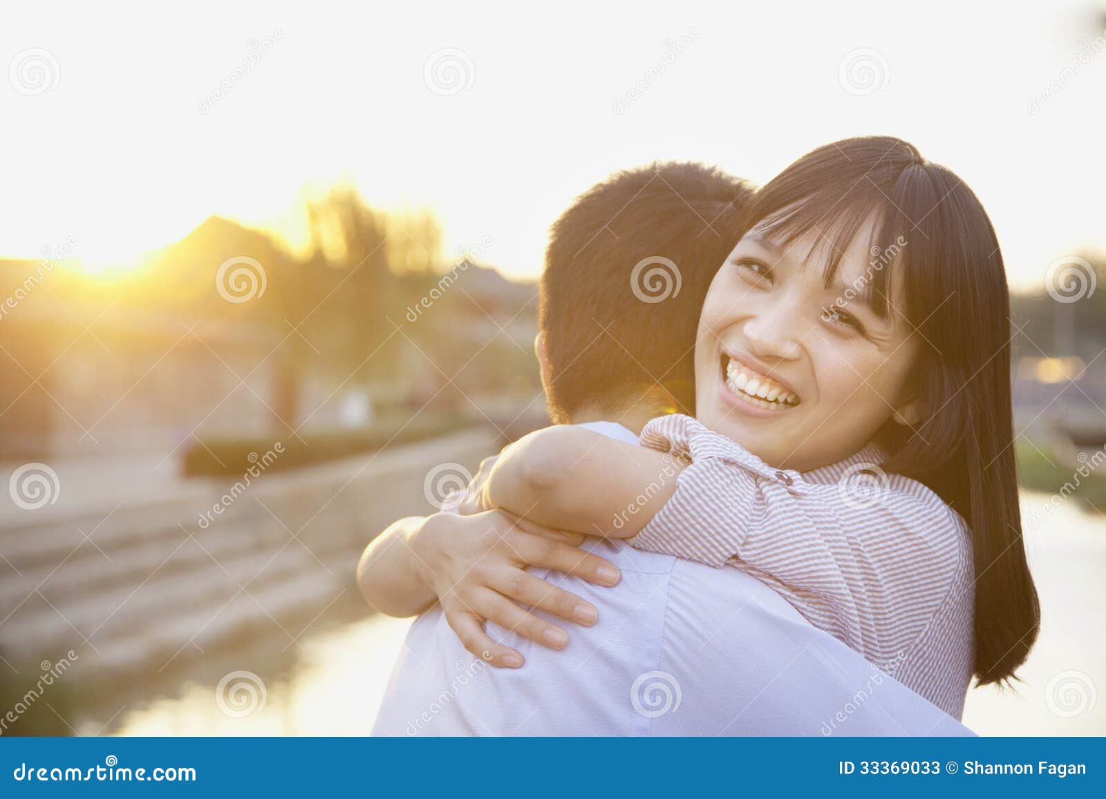 Happy Young Couple Hugging stock image. Image of hair - 33369033