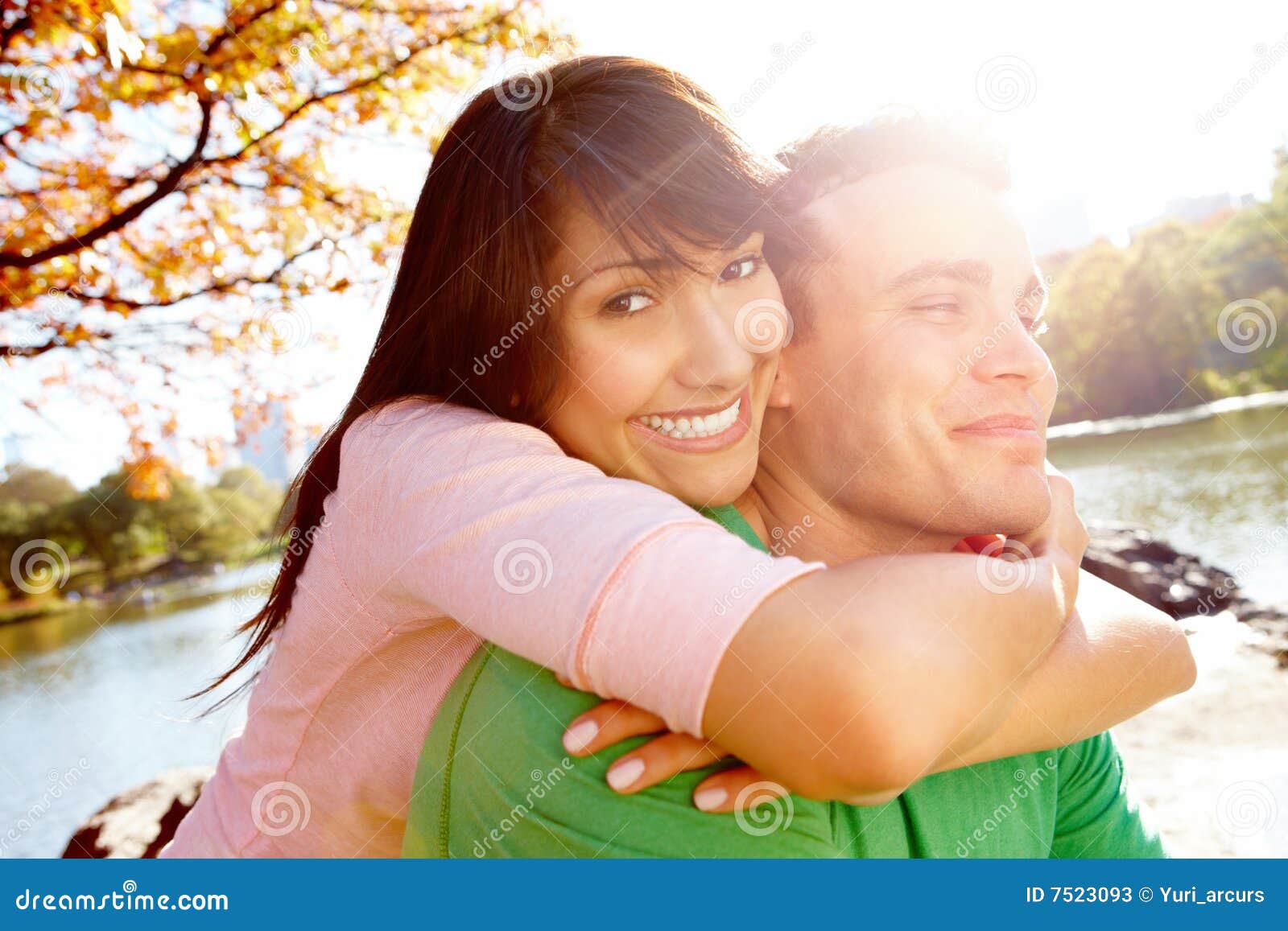 Happy Young Couple Hugging Outdoors Stock Image - Image of expression ...