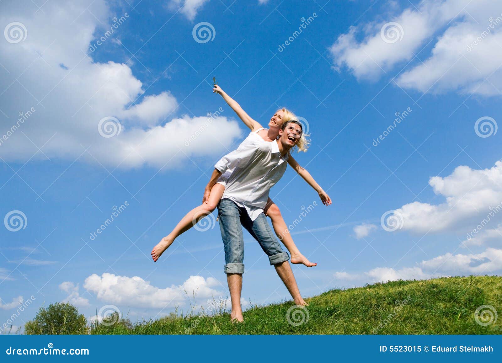 Happy Young Couple - Jumping in the Sky Stock Image - Image of active ...