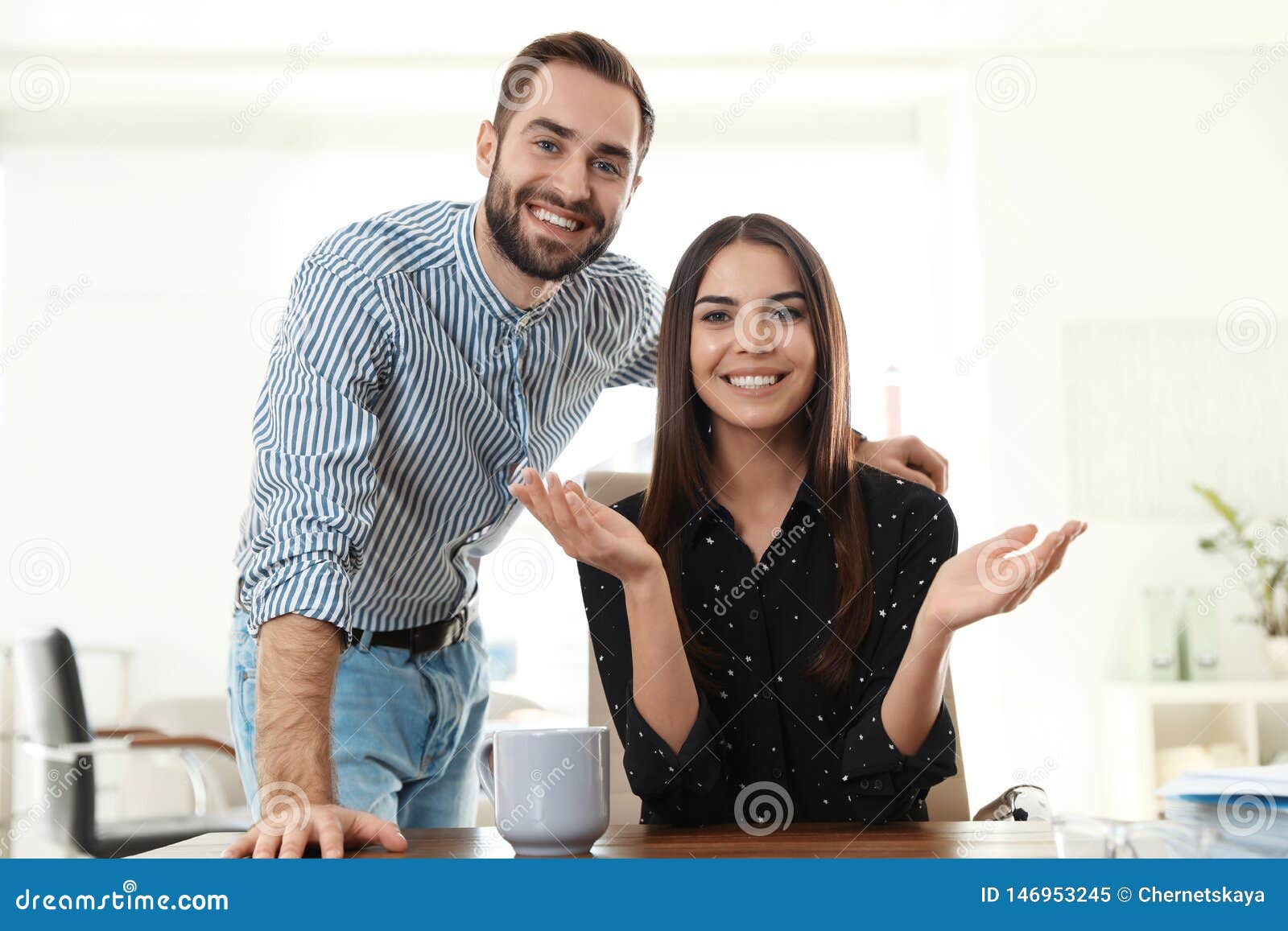 Happy Young Couple Looking at Camera and Using Video Chat Stock Image ...