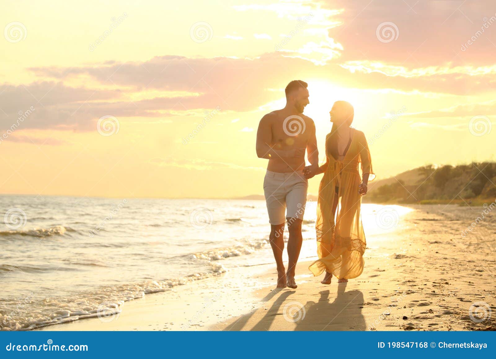 Happy Young Couple Running Together on Beach Stock Photo - Image of ...
