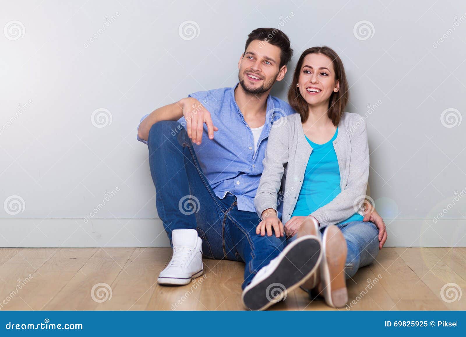 Happy young couple stock image. Image of boyfriend, sitting - 69825925