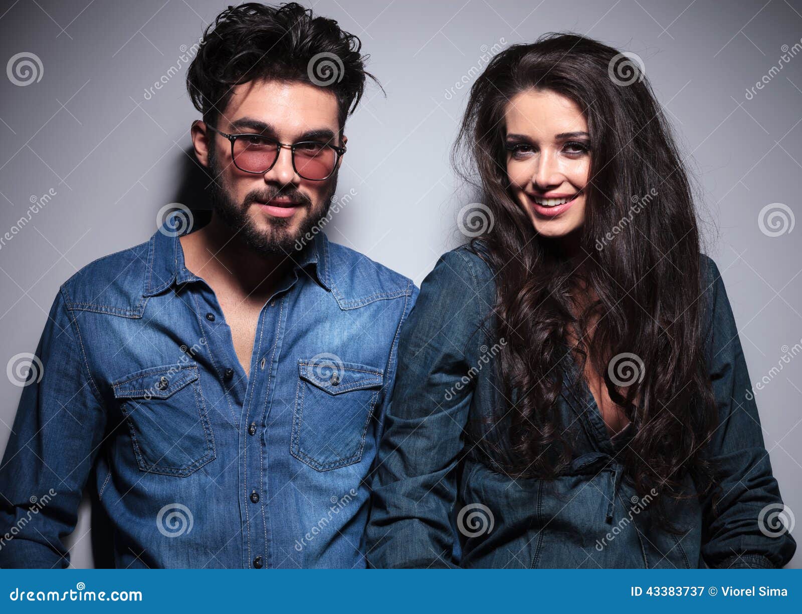 Happy Young Couple Smiling Together Stock Image - Image of studio ...