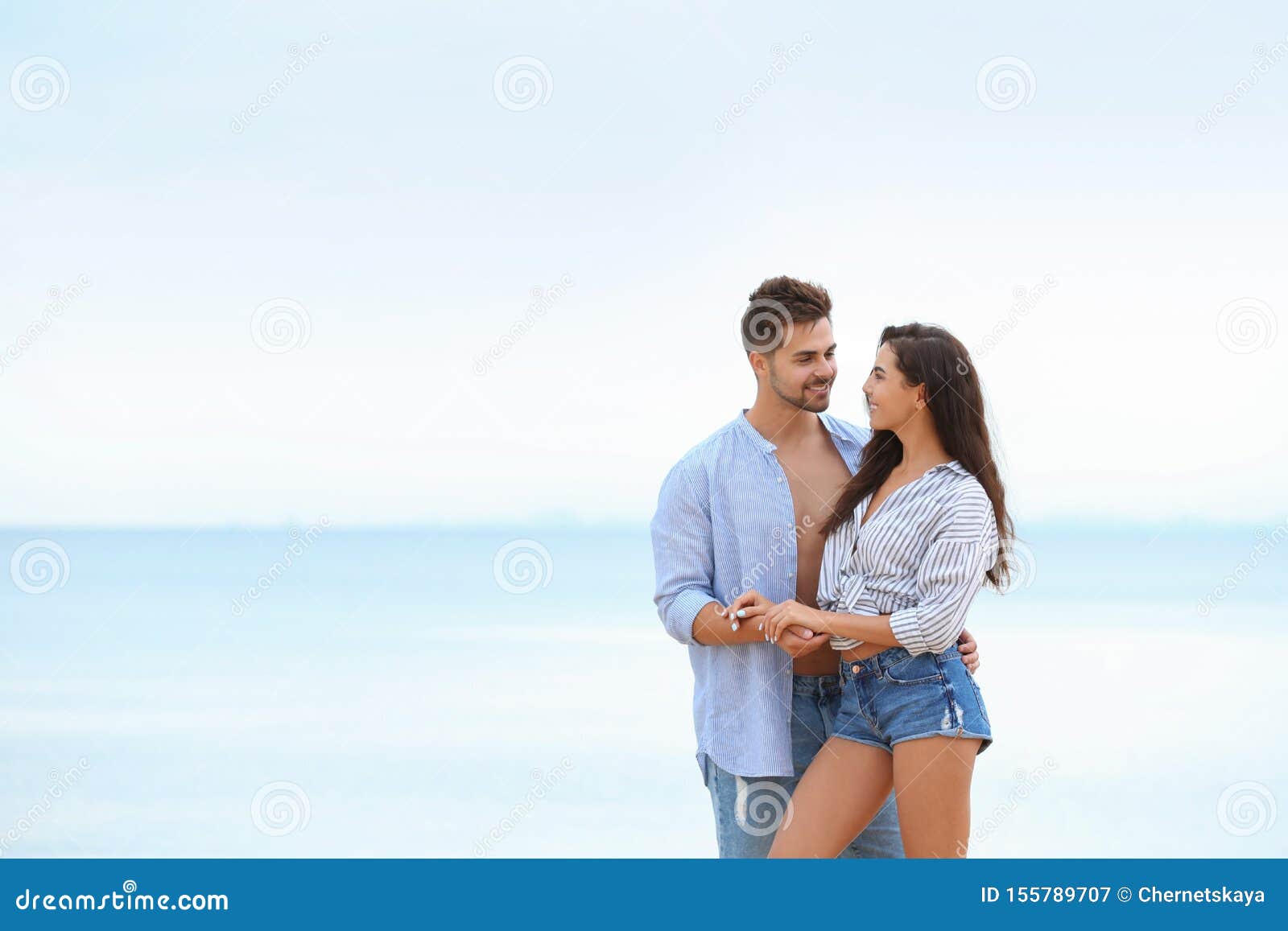 Happy Young Couple Spending Time on Beach Stock Image - Image of male ...